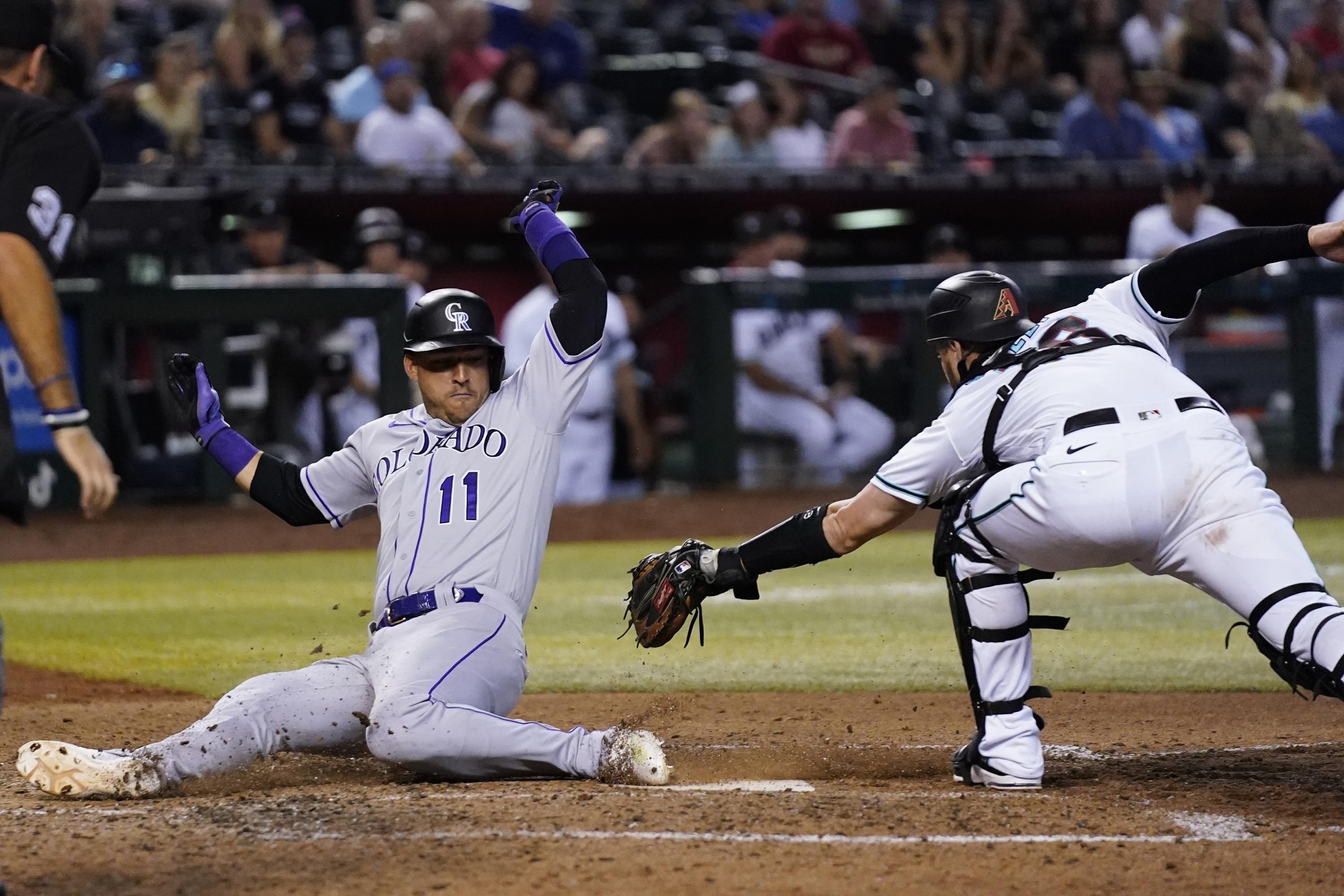 Grichuk hits tiebreaking double in 9th, Rockies beat D-backs | AP News