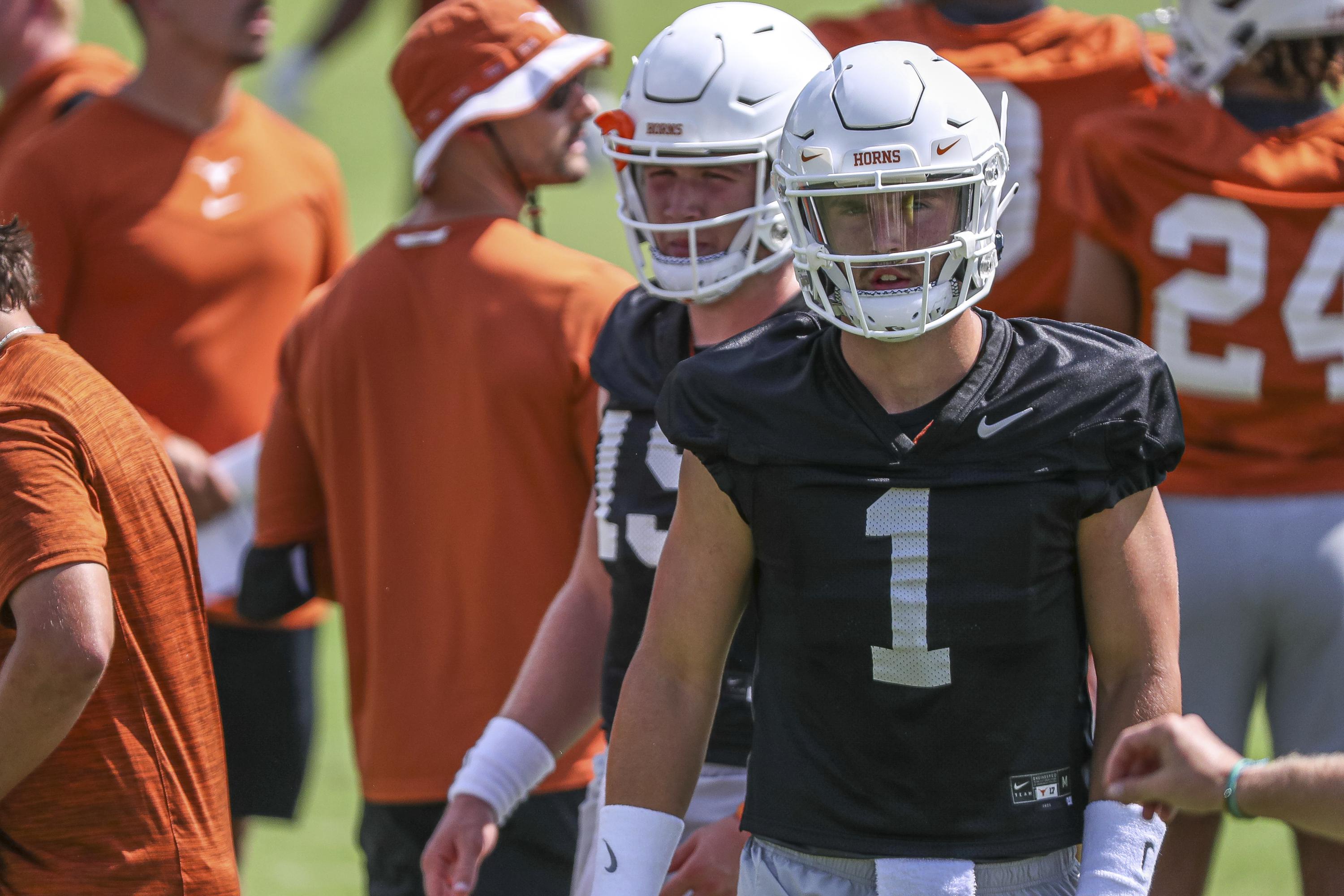 Texas finally shows its hand with Card picked as No. 1 QB | AP News