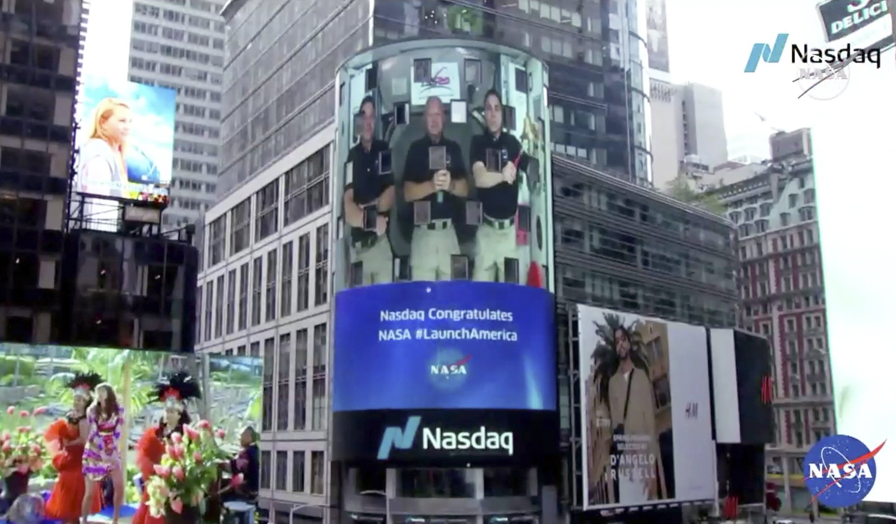 Astronauts ring opening bell for Nasdaq from space station | AP News