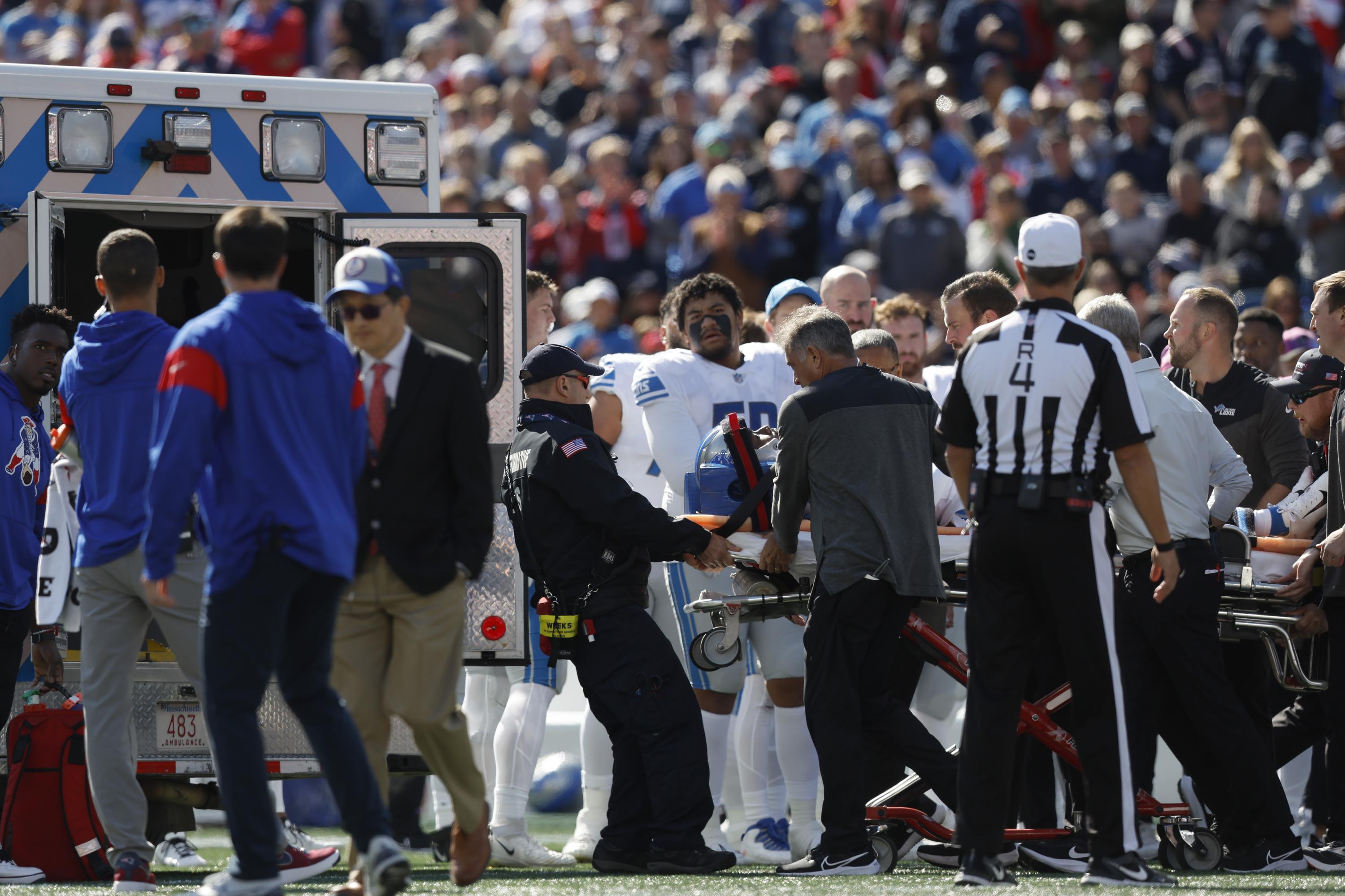 Lions defensive back Smith carted off the field vs. Pats | AP News