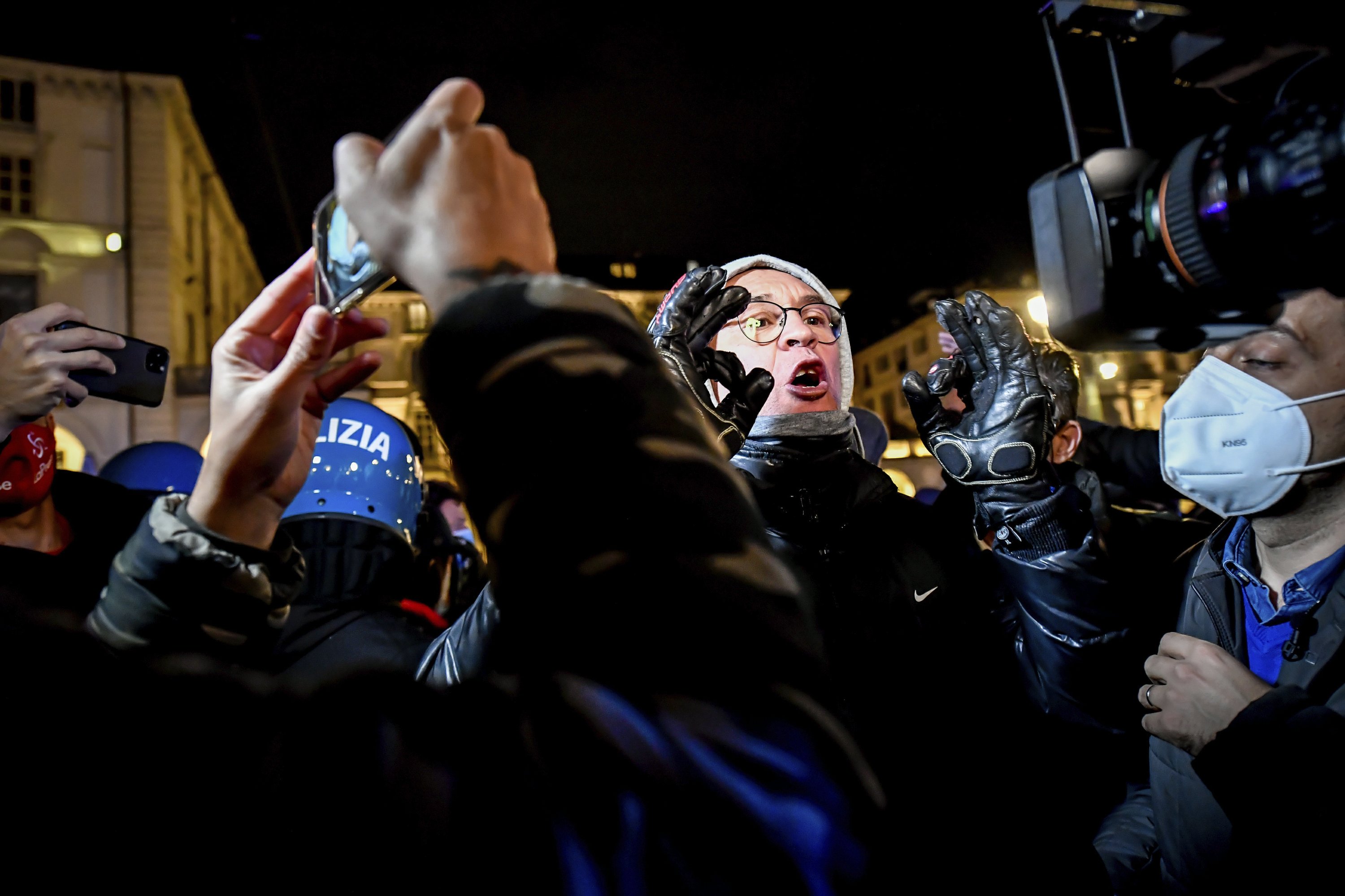 Protests in Italy over new virus crackdown turn violent | AP News