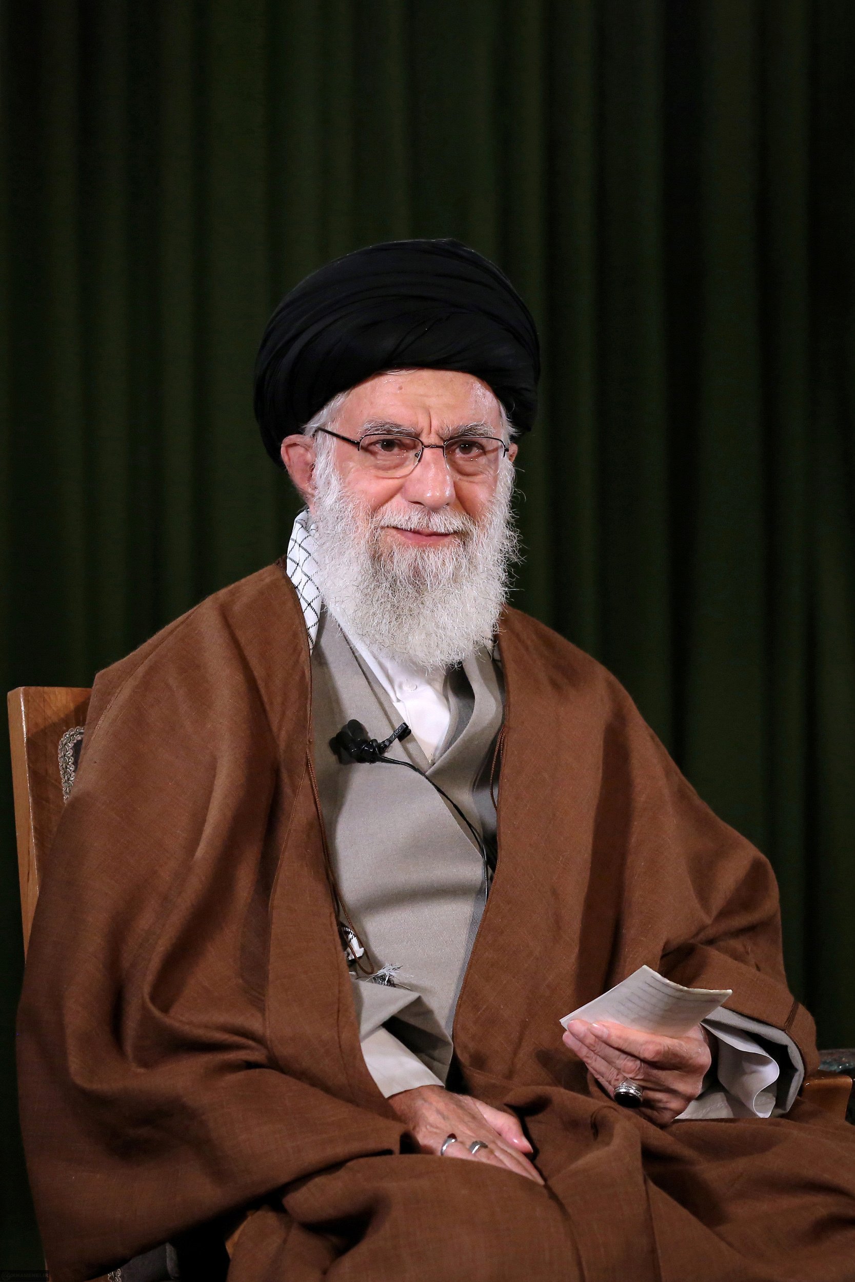 Iran's leaders strike upbeat tone as virus toll climbs | AP News