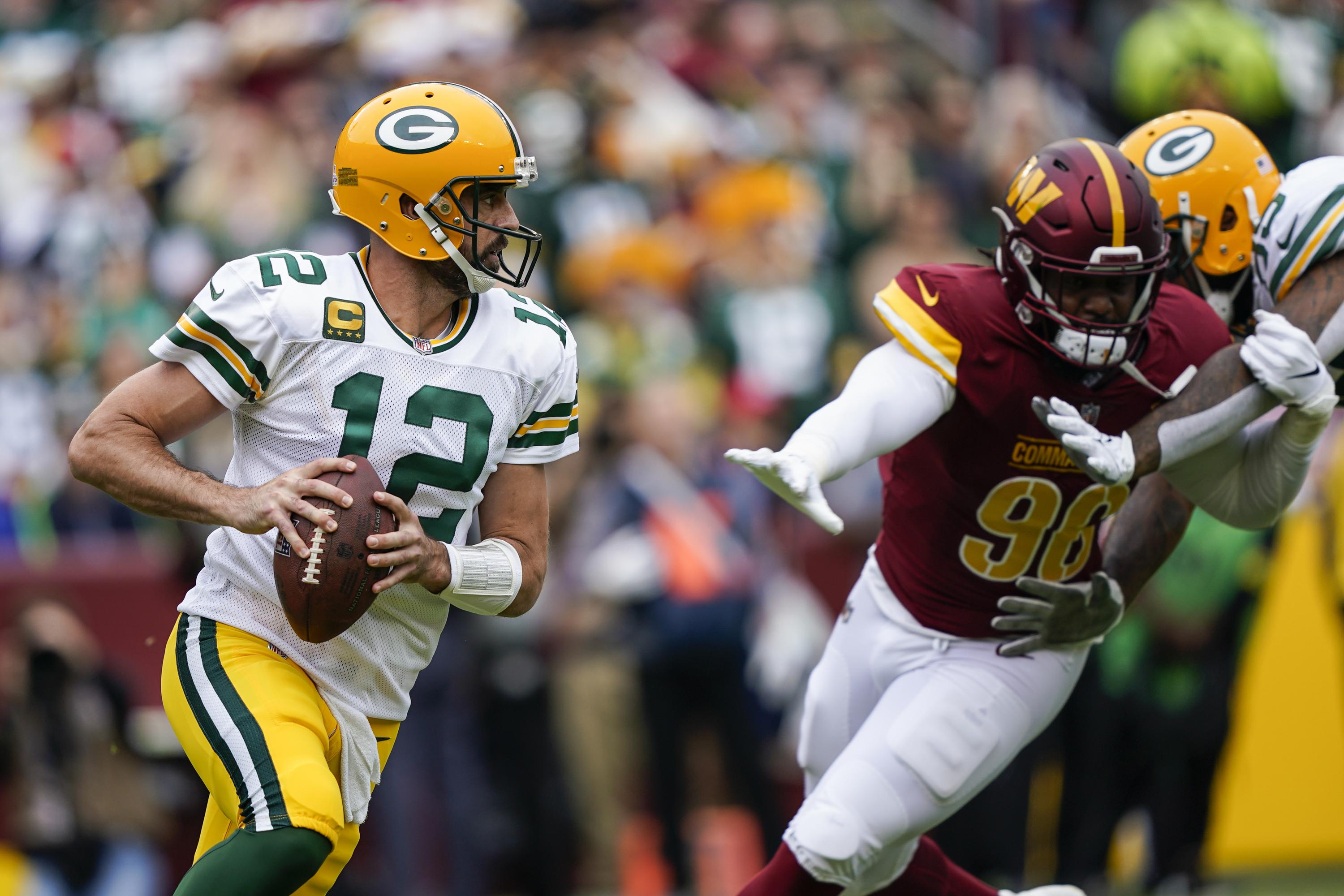 Aaron Rodgers y los Packers pierden 23-21 ante Commanders | AP News