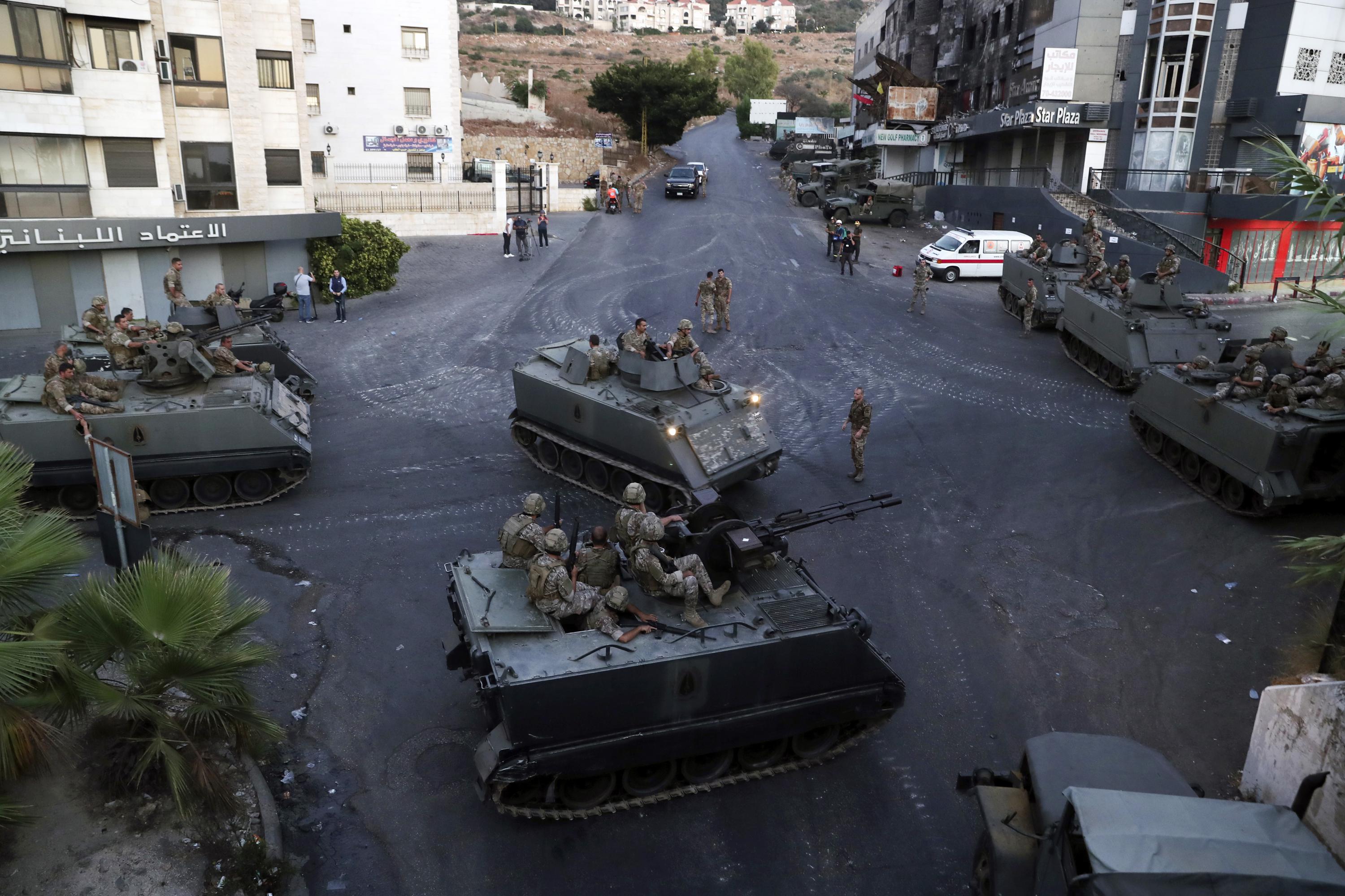 Gunmen kill 2 at funeral for Hezbollah commander in Lebanon | AP News