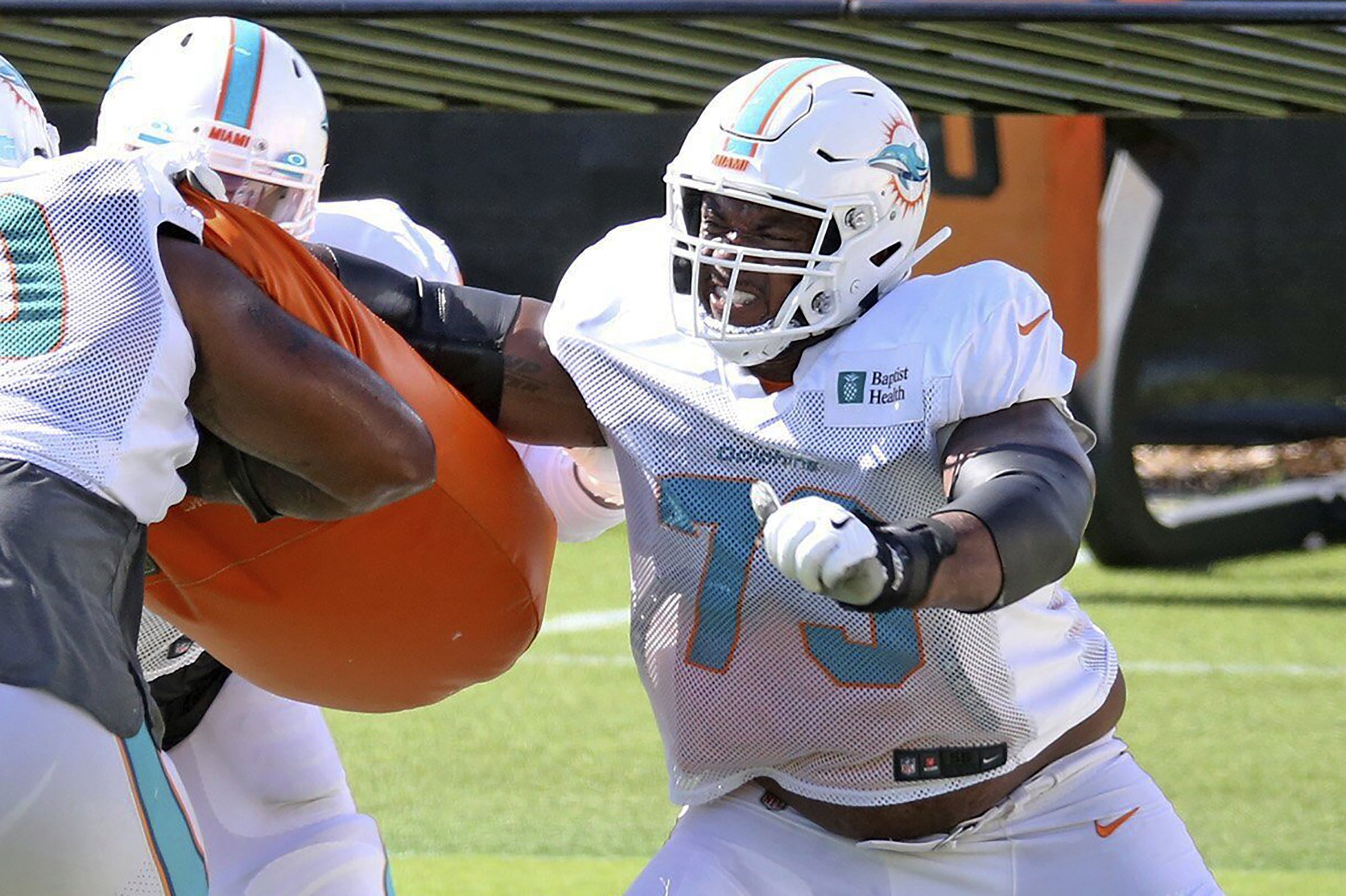 Dolphins rookie LT Austin Jackson goes on injured reserve | AP News