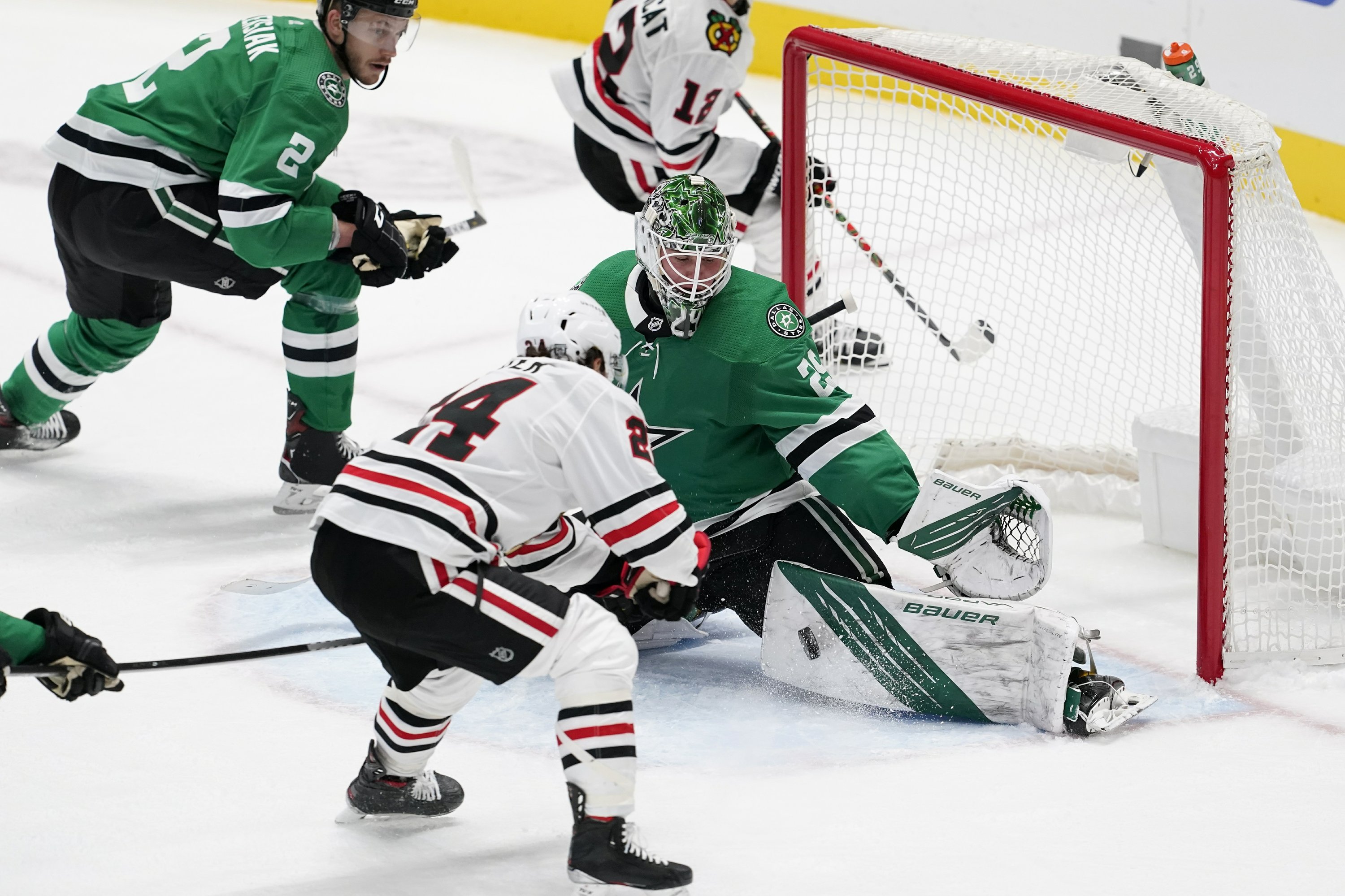 Suter scores winner as Blackhawks edge Stars 2-1 in OT again | AP News