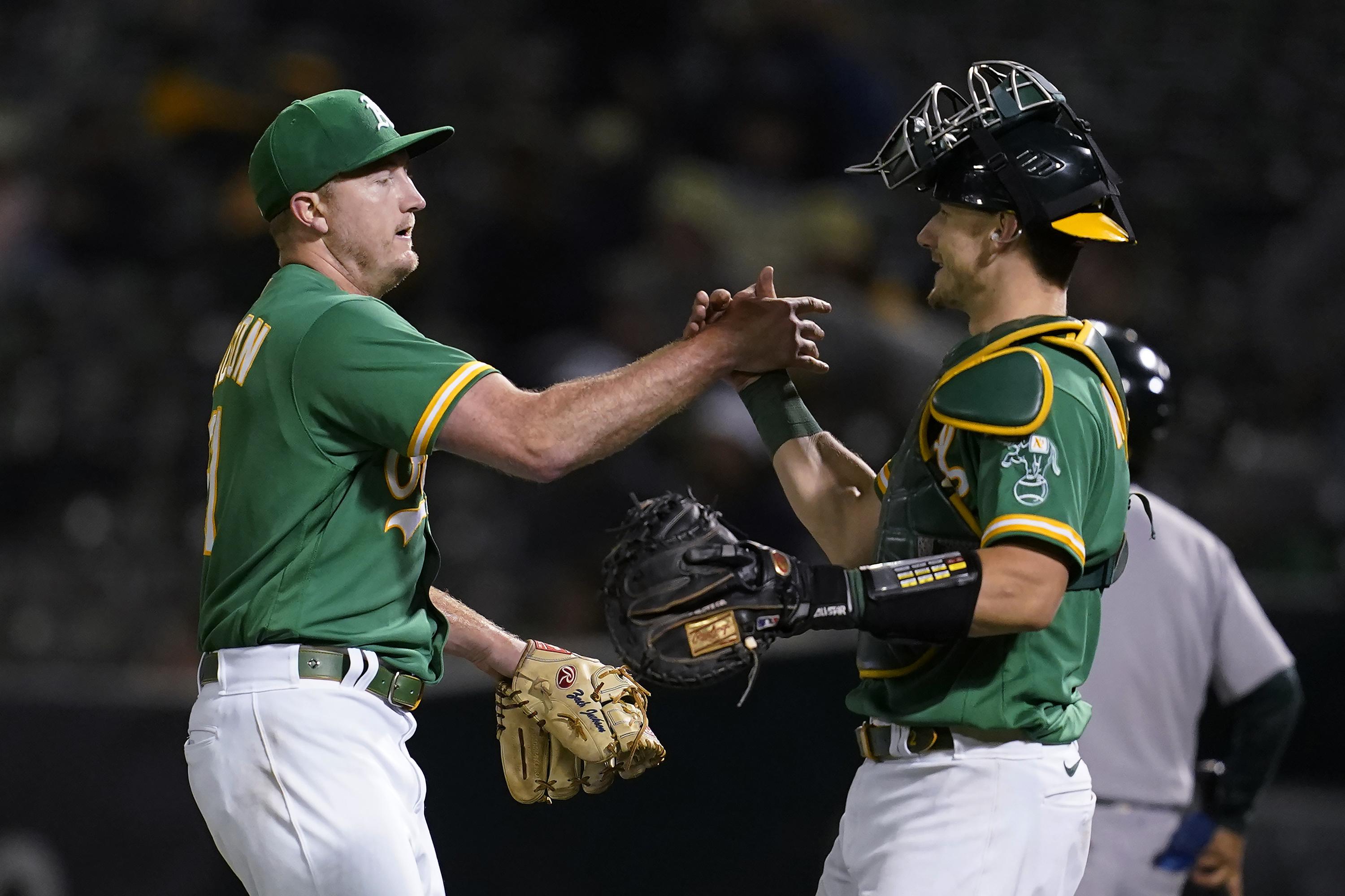 A's benefit from Rangers' defense, win 3-1 for 3rd straight | AP News