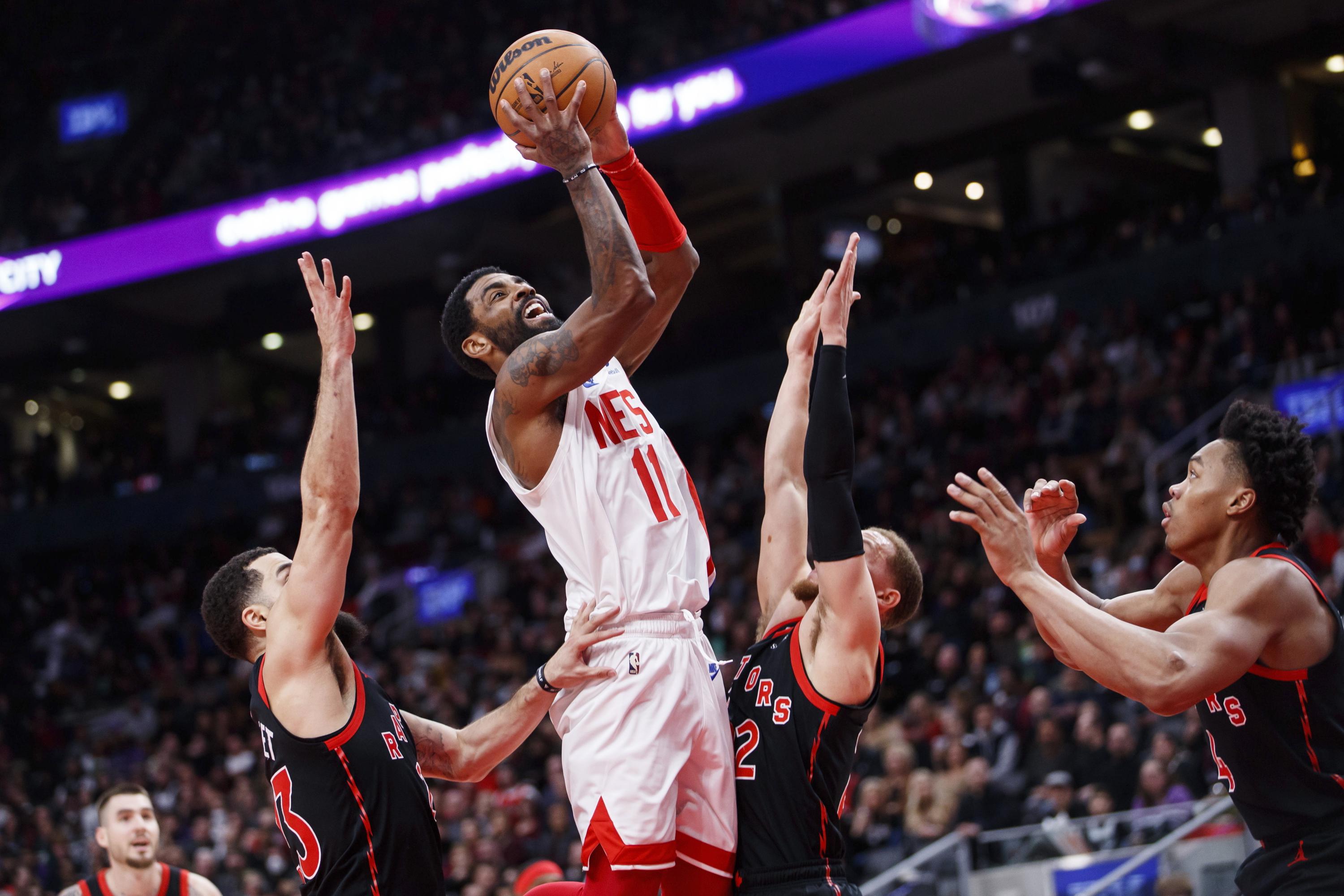 Con triple de Irving, Nets vecen 119-116 a Raptors | AP News