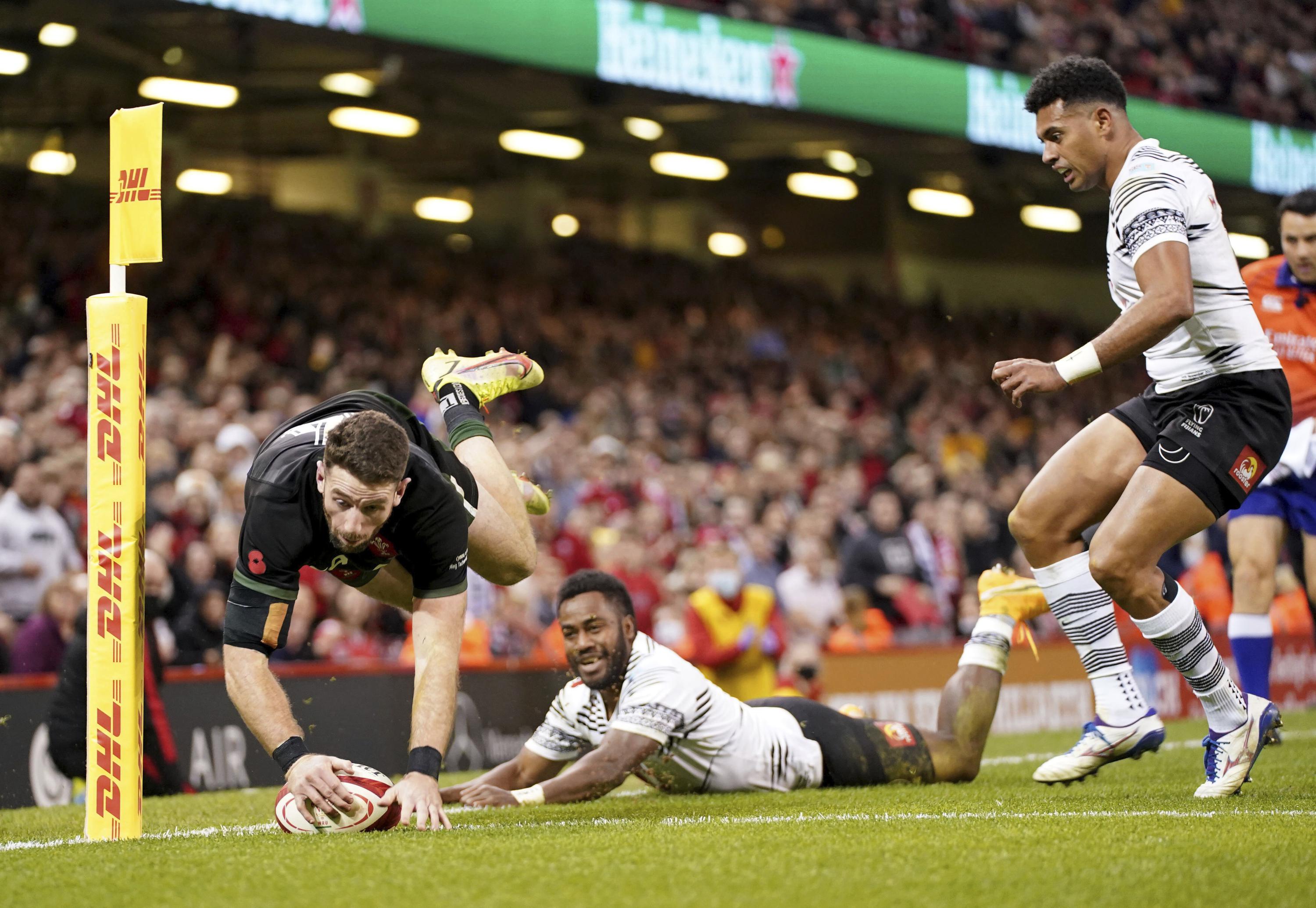 Wales overcome 14-man Fiji with flattering 38-23 win | AP News