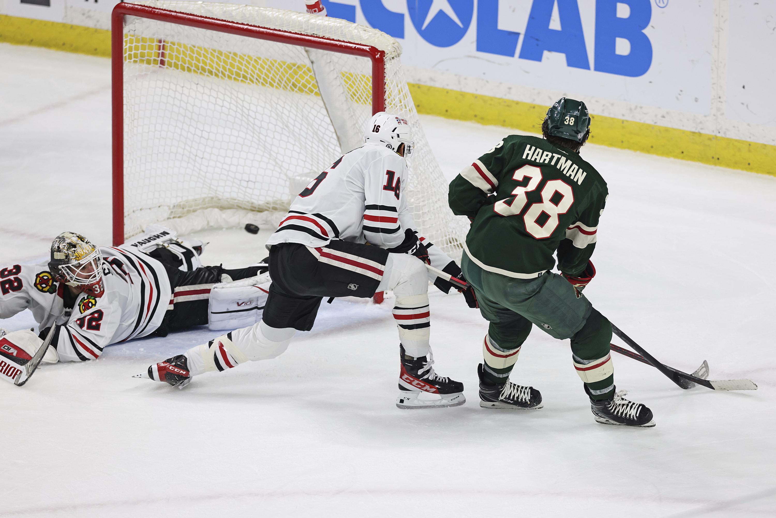 Hartman scores late, Wild beat Blackhawks 3-1 | AP News