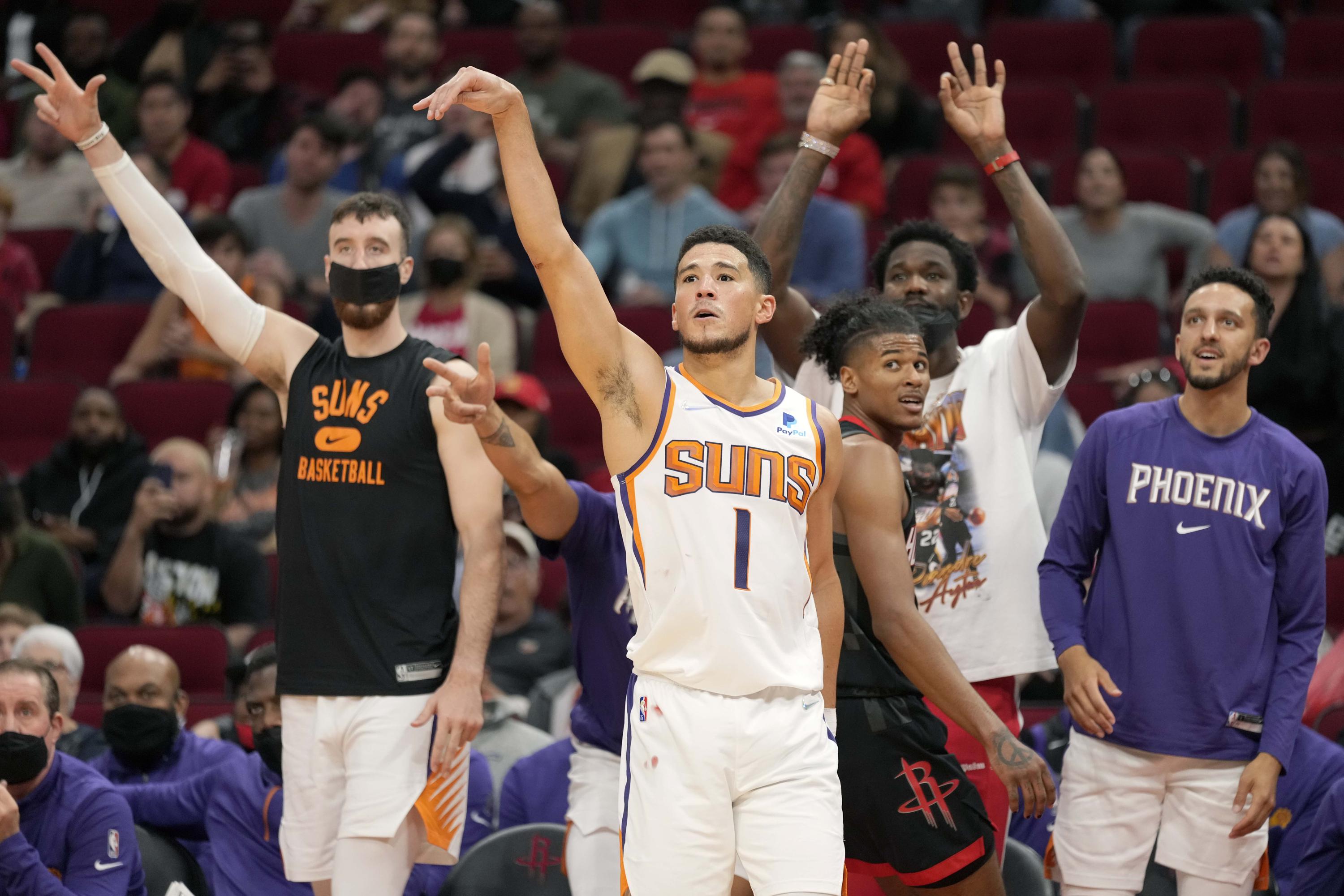 Suns win 8th straight, hand Rockets 11th loss in a row | AP News