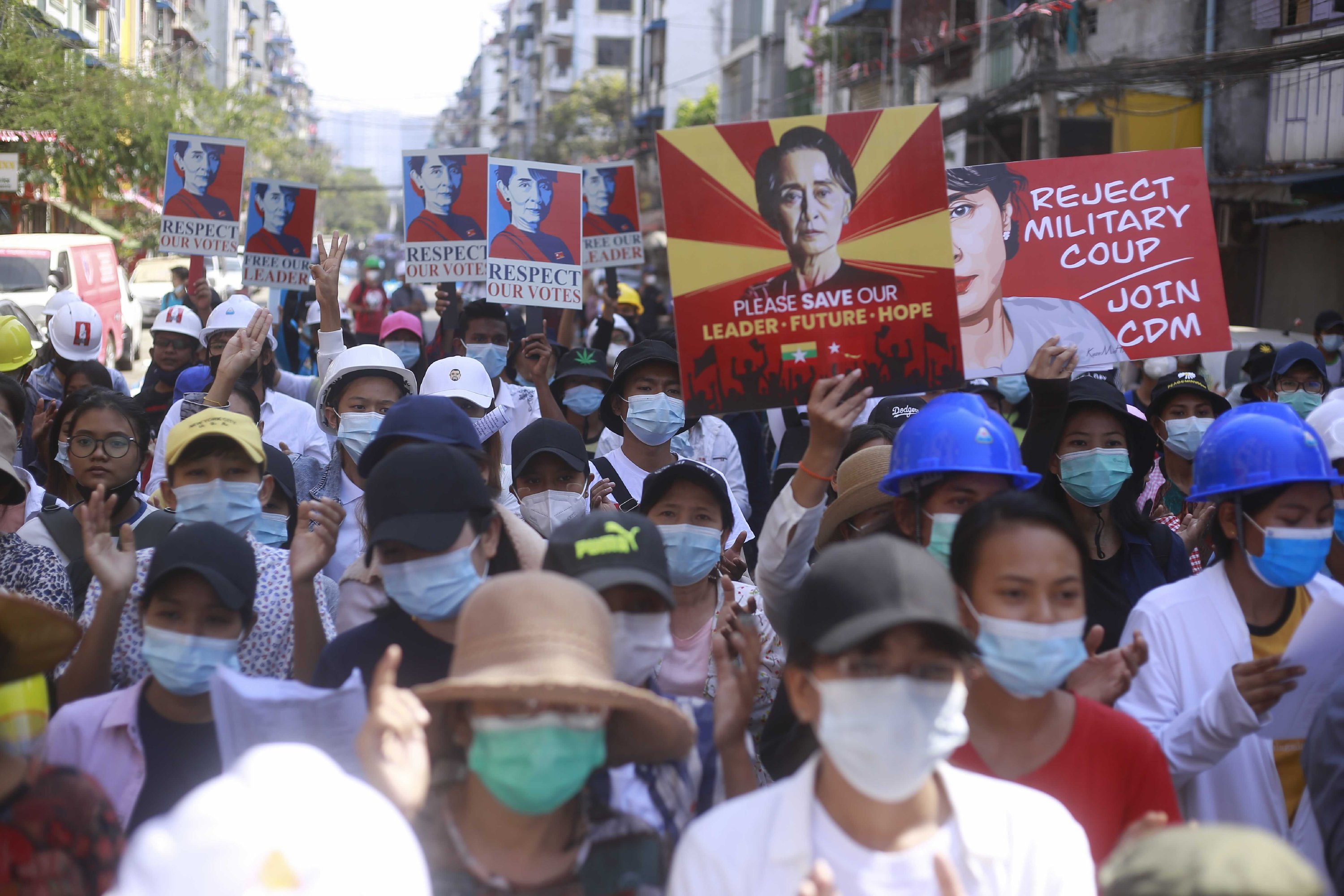Protesters defy Myanmar security forces as UN action urged | AP News