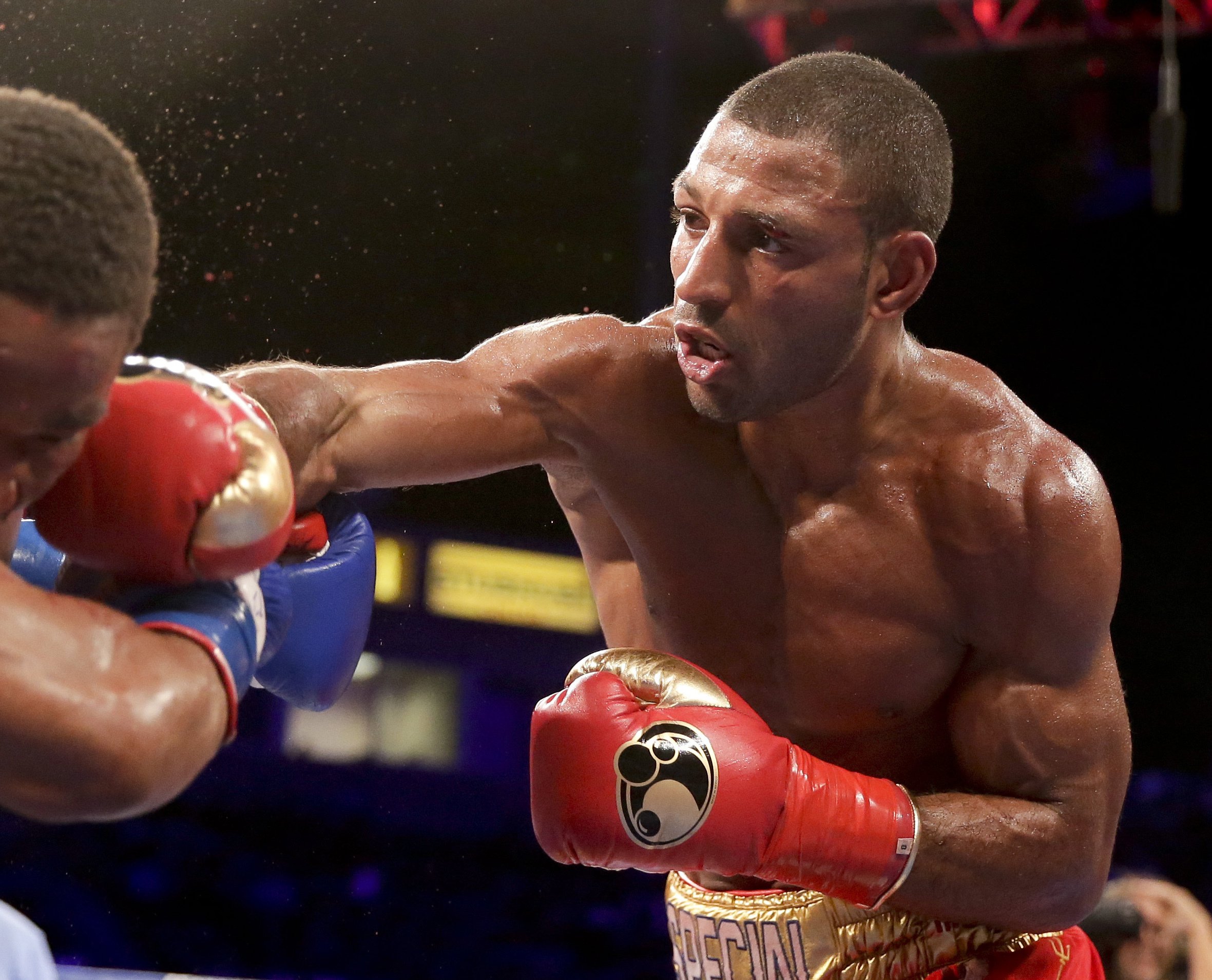 Crawford returns to ring in title defense against Brook | AP News