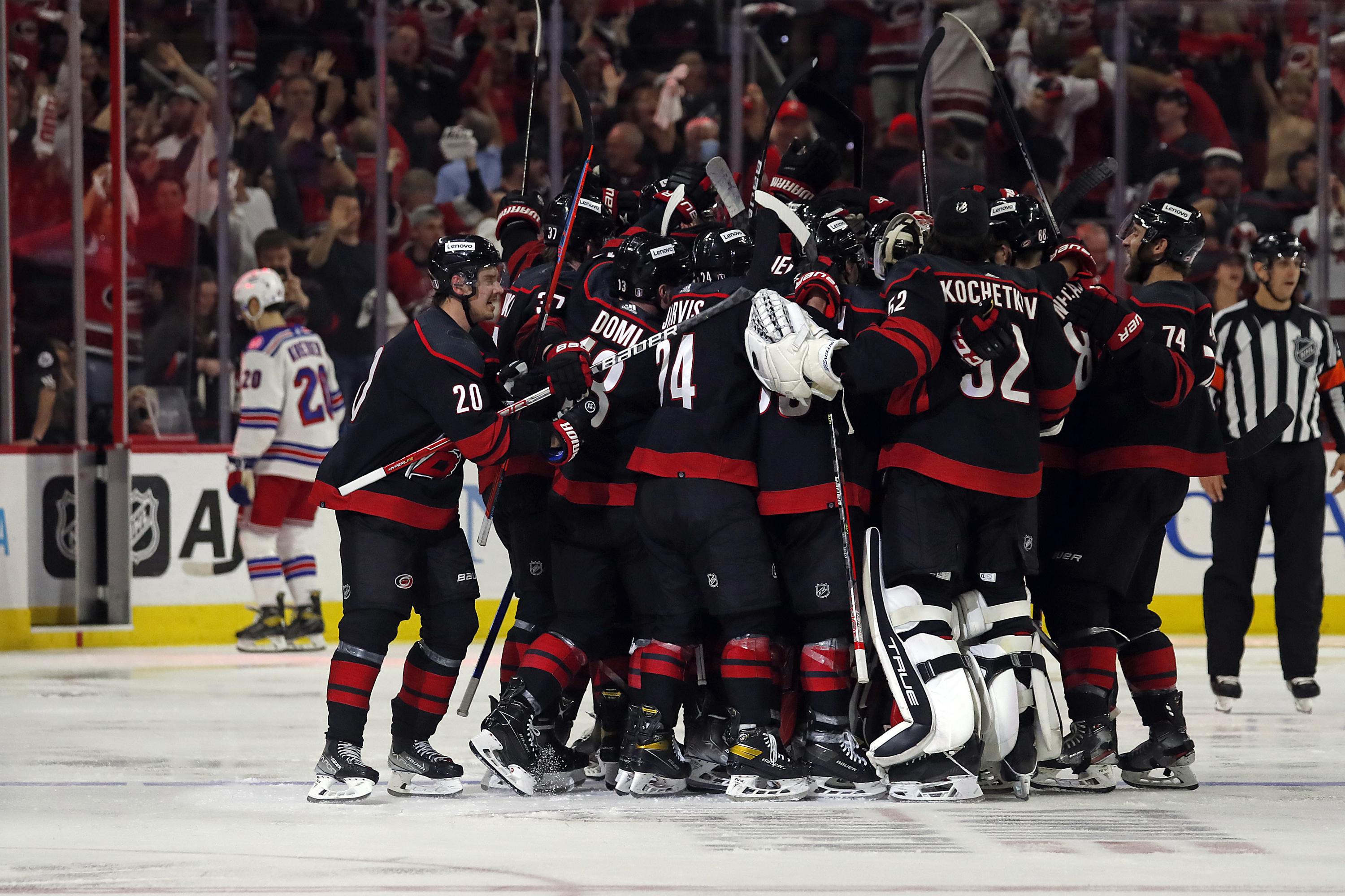 Cole's OT goal lift Hurricanes past Rangers for Game 1 win | AP News