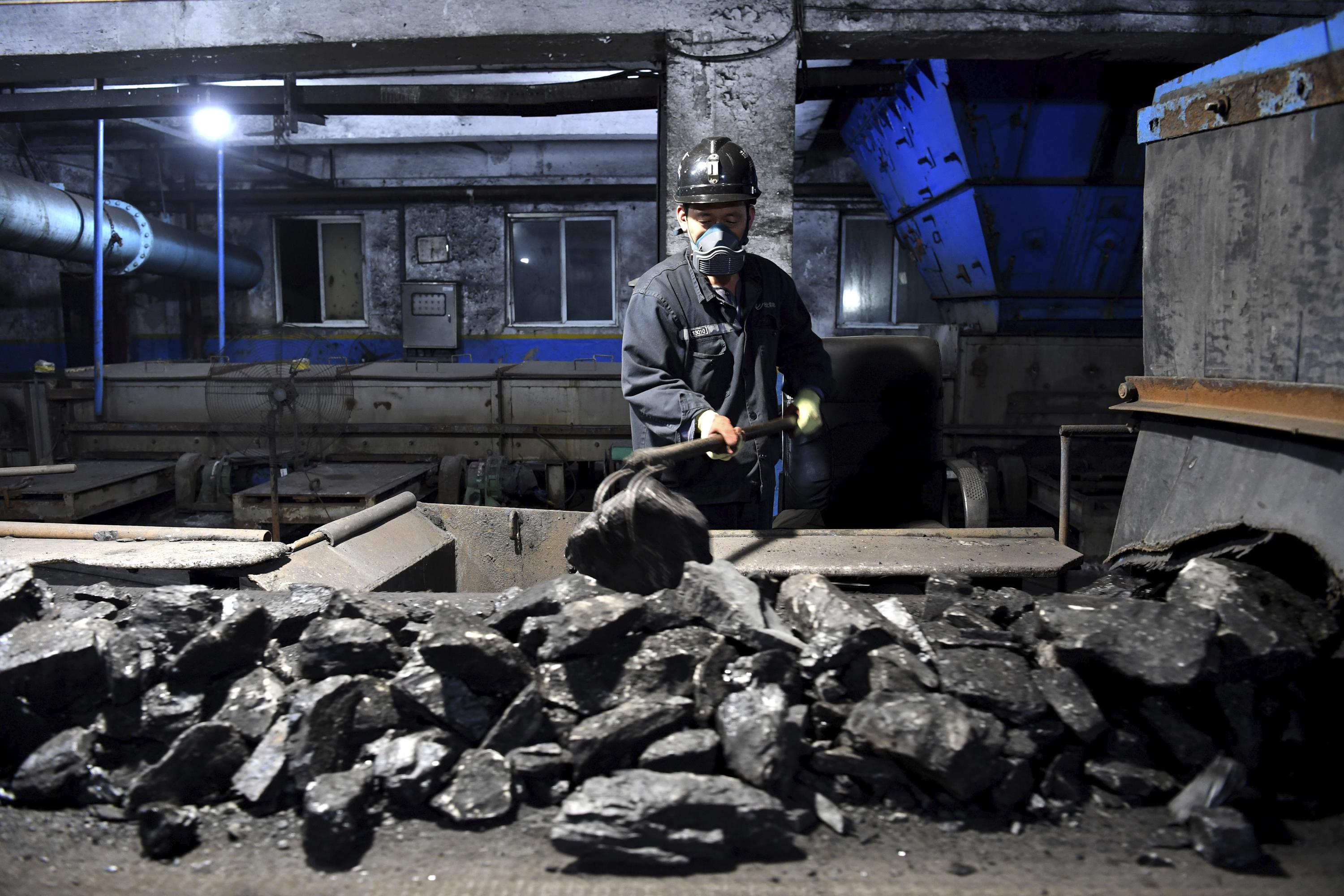 Official: China mining more coal but increasing wind, solar | AP News