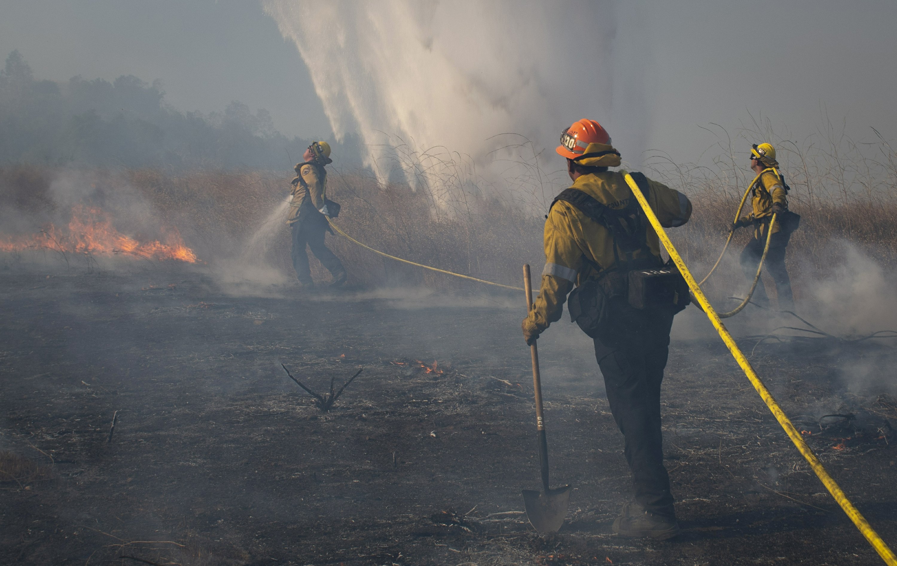 The Latest: Man accused of arson in California wildfire