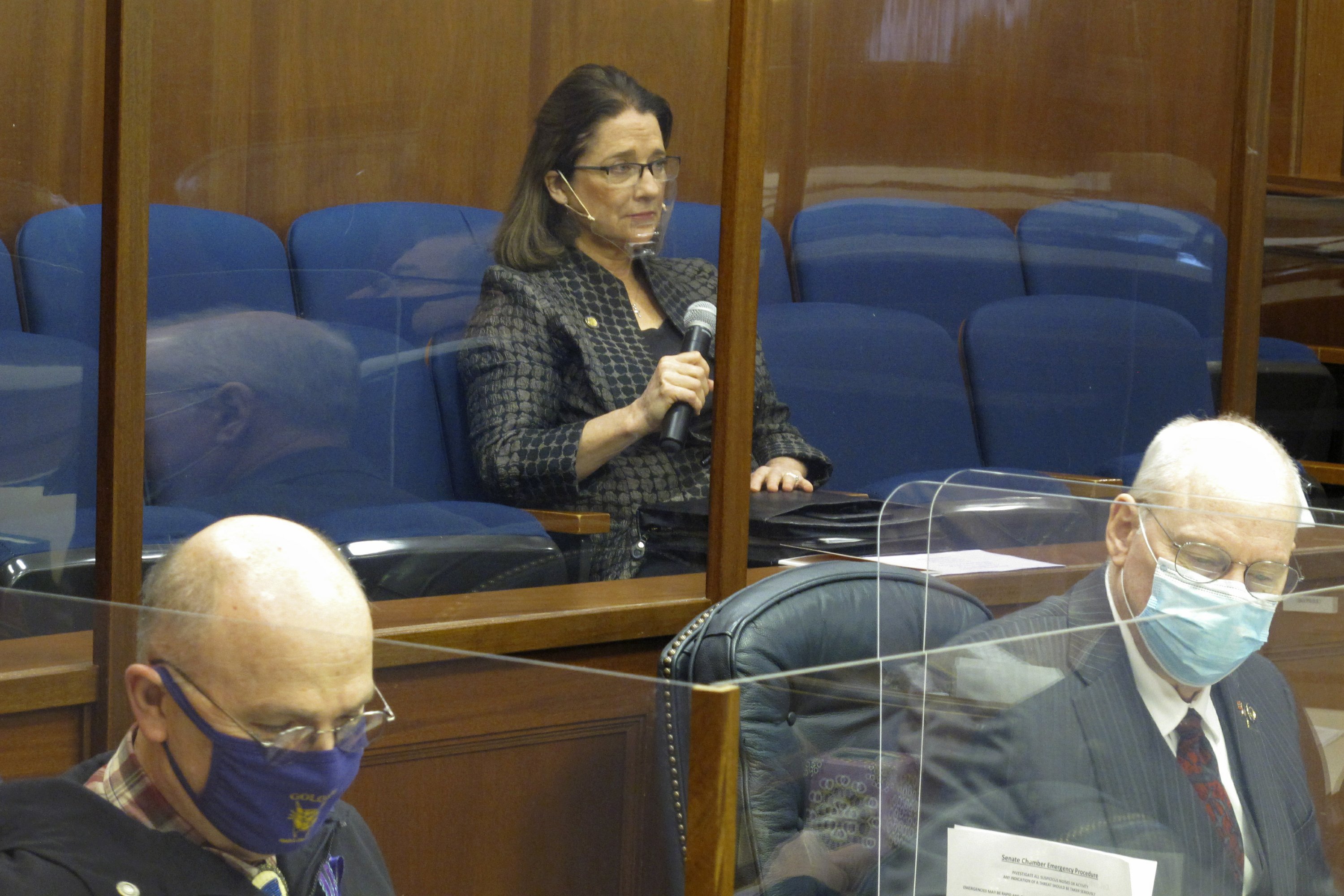 Alaska Senate leaders accommodate member over virus rules | AP News