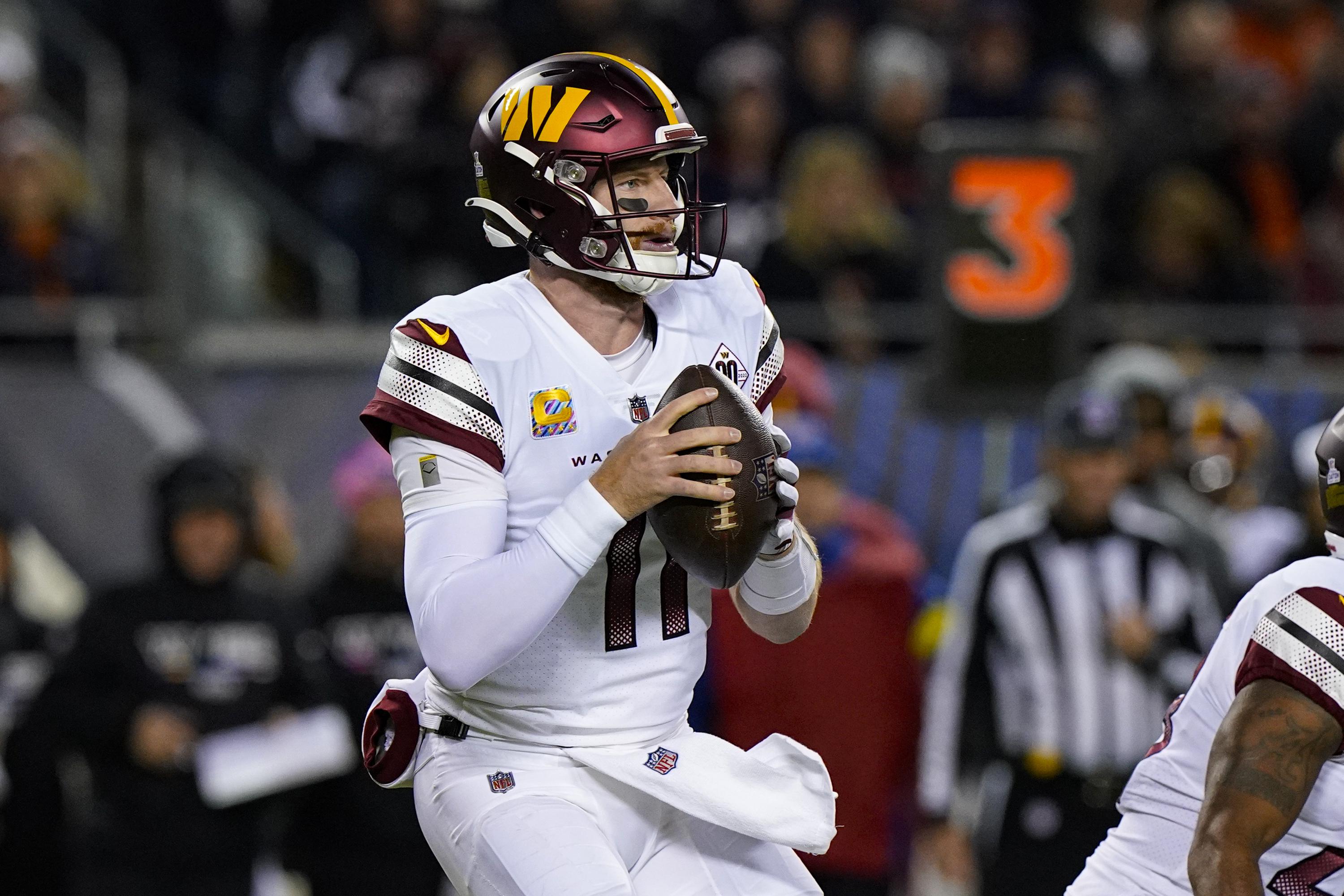 Commanders' QB Wentz to IR; will miss at least four games | AP News