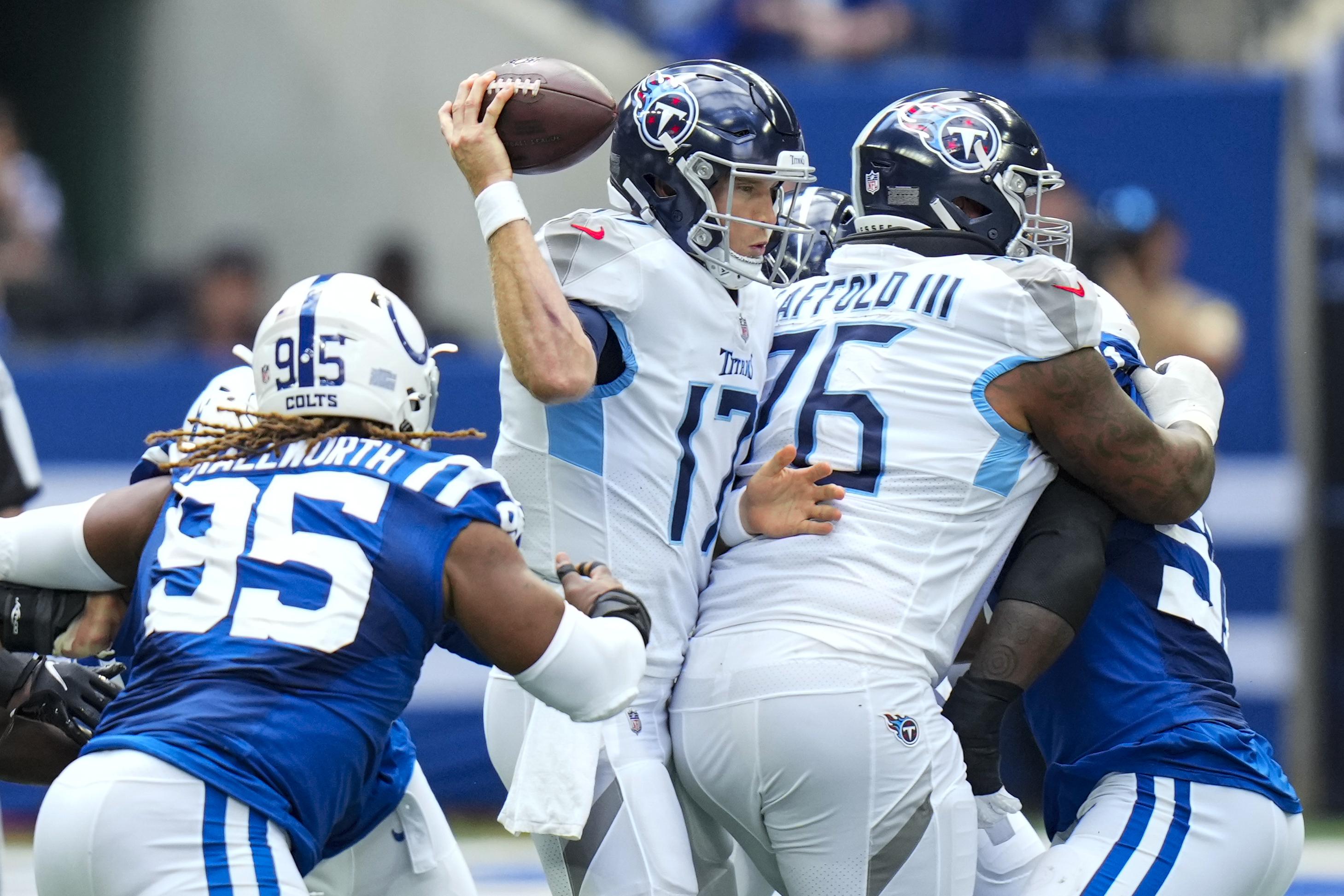 Titans use late turnovers to pull off 34-31 OT win at Indy | AP News