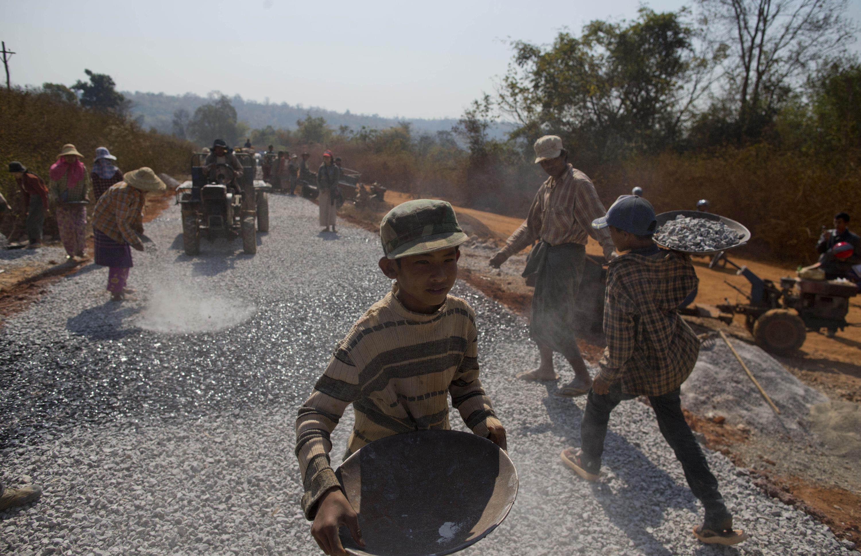 Road paved with granite and hope comes to Myanmar | AP News