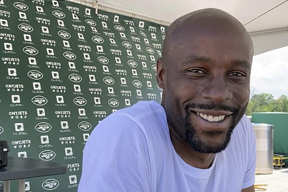 Jets' Washington shining as assistant after All-Pro career | AP News