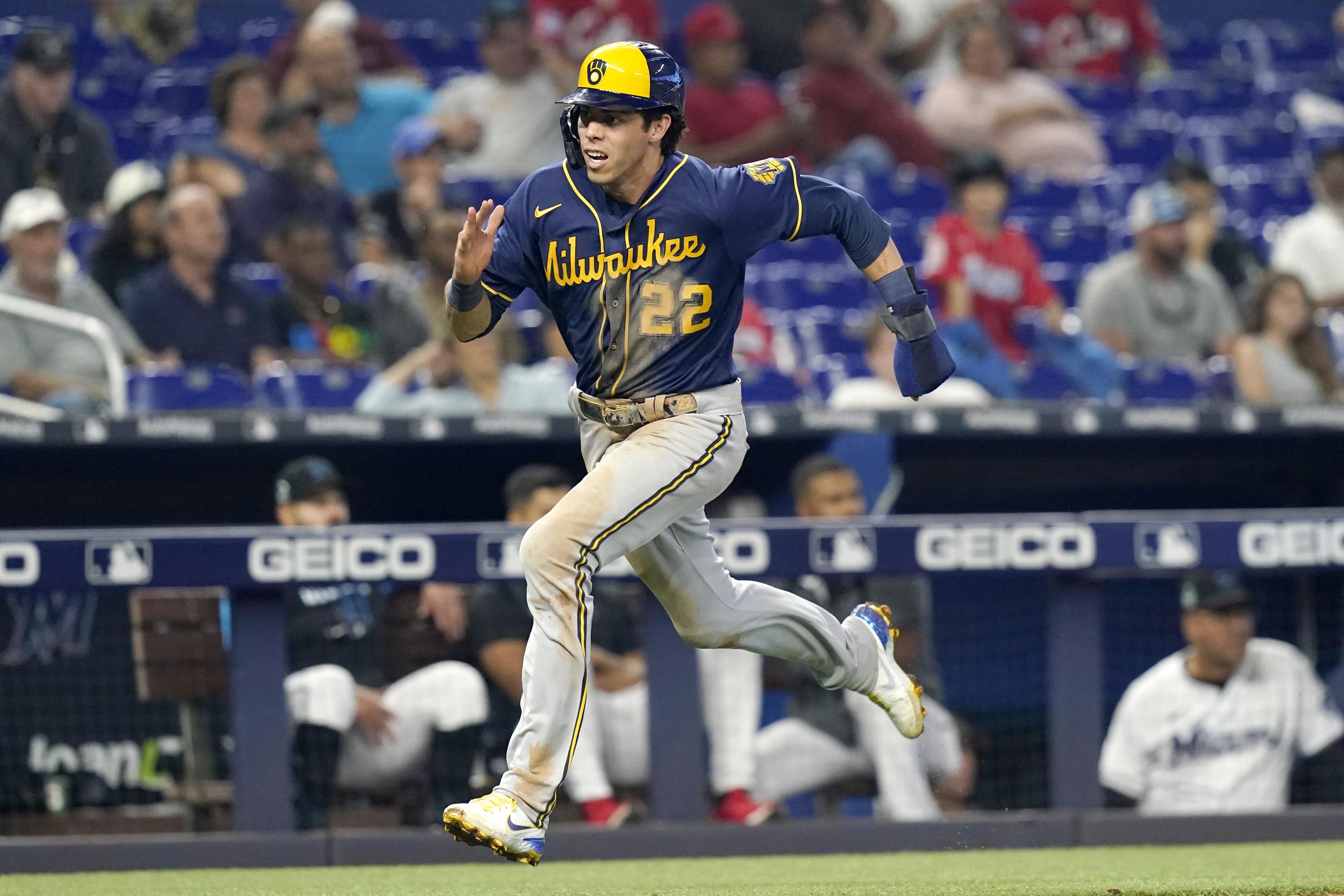 Wong leads Brewers to 7-3 win over the Marlins | AP News
