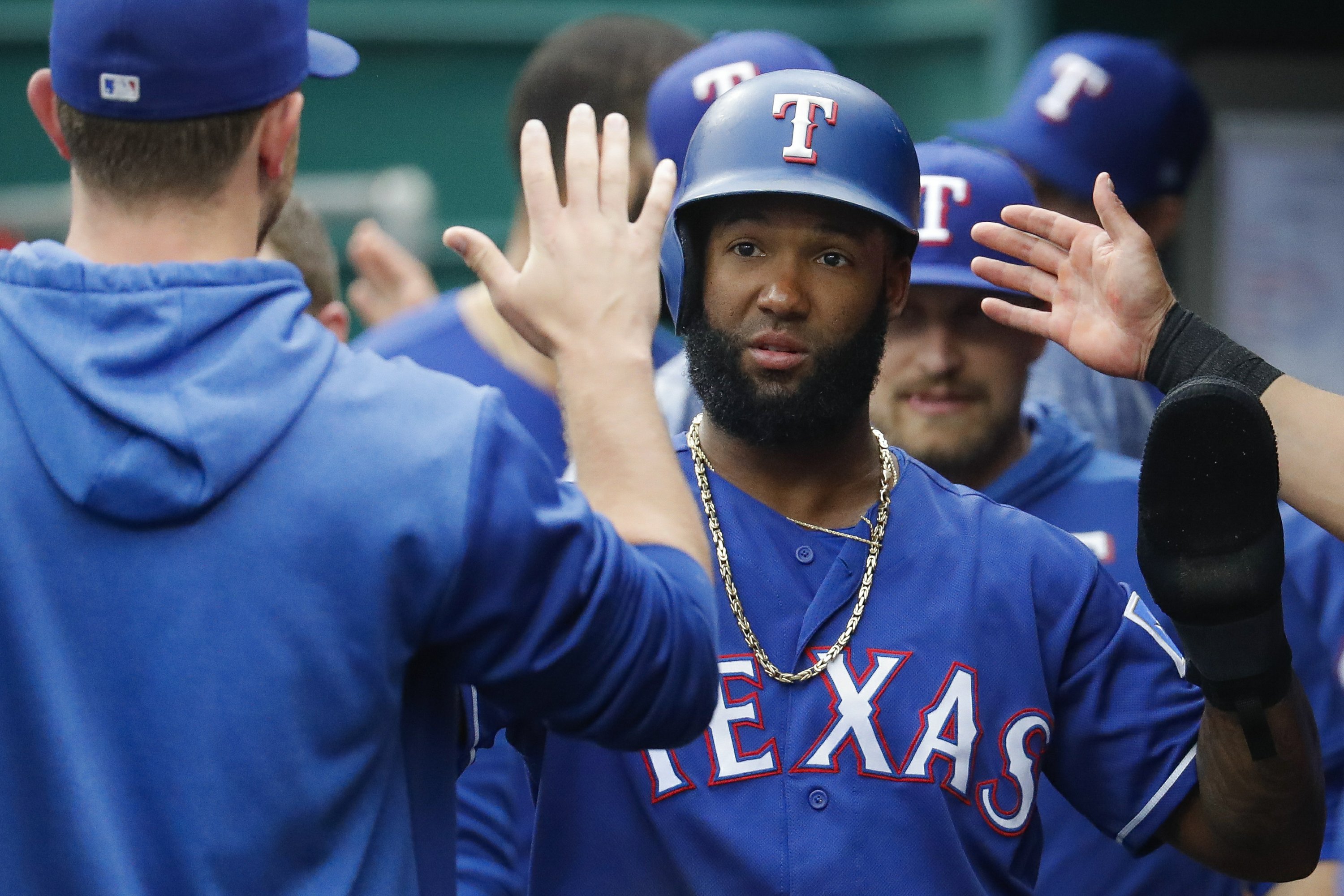 Minor logra 1ra victoria de junio, Rangers ganan a Rojos 4-3 | AP News