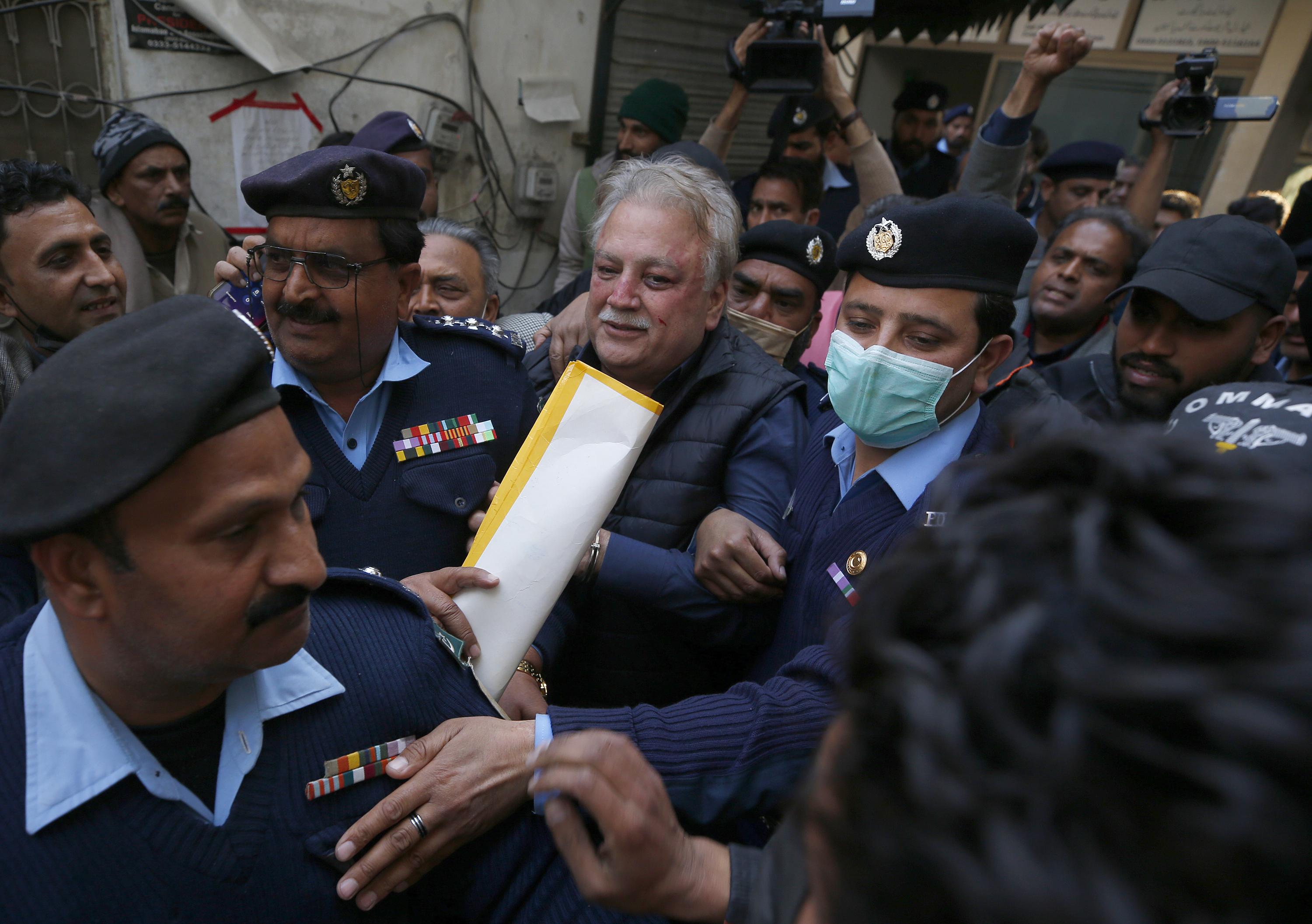 Pakistani police arrest media owner after scuffle in capital | AP News