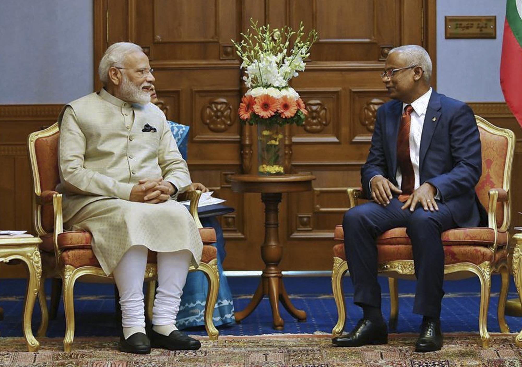 Modi visits Maldives, signaling India's return as key ally | AP News