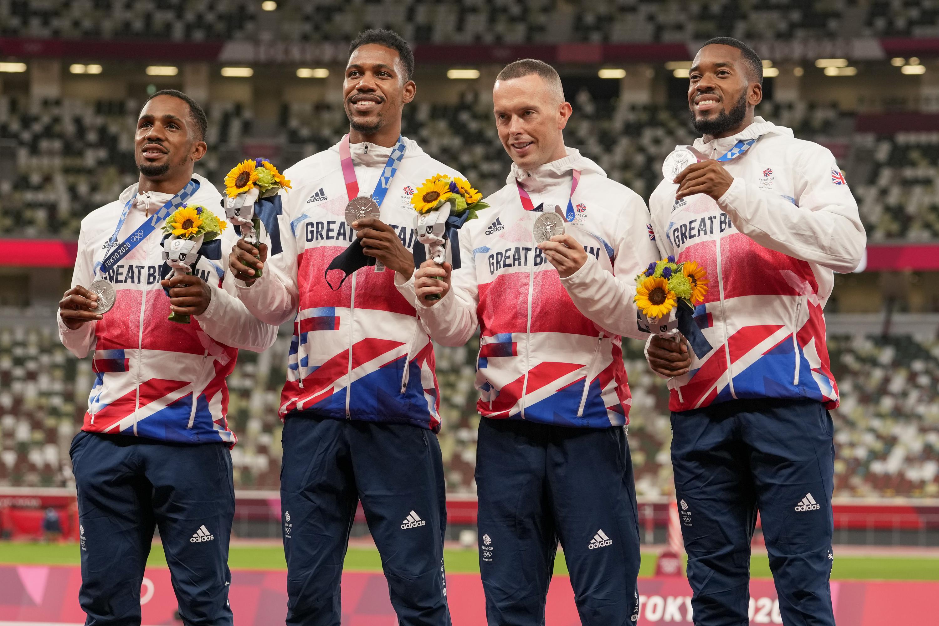 Britain's relay team loses Olympic silver over Ujah doping | AP News
