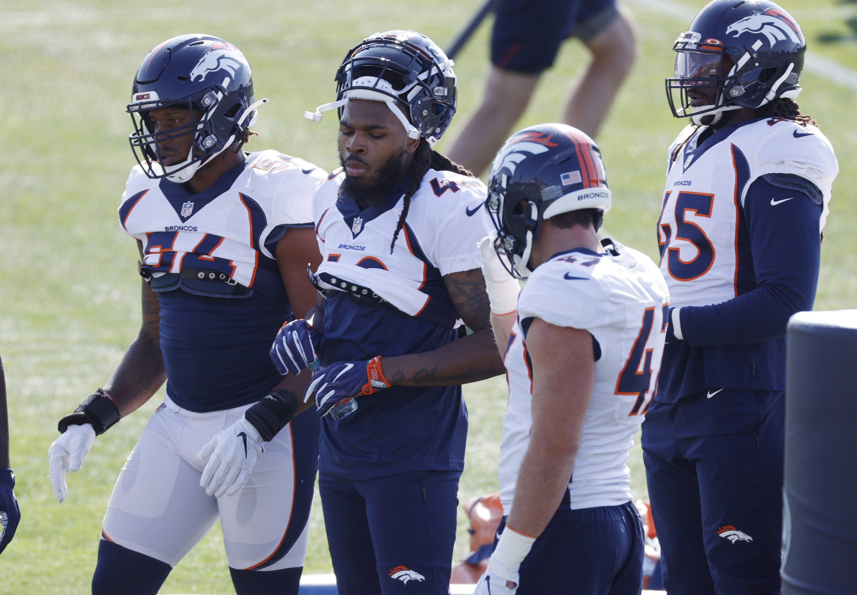 Broncos cut ties with their leading tackler Todd Davis | AP News