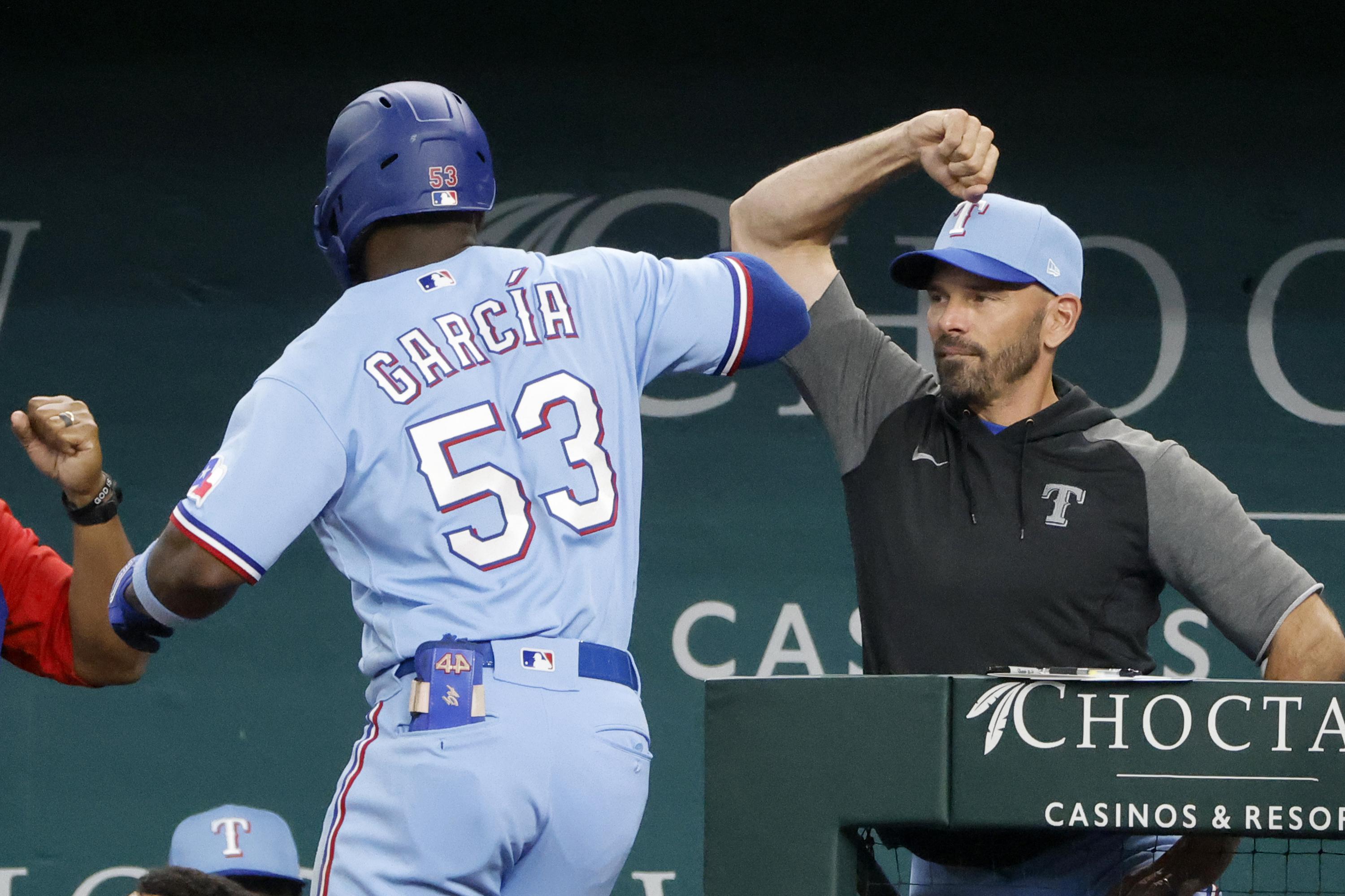 García slam for Rangers in 13-2 win to avoid sweep by Astros | AP News
