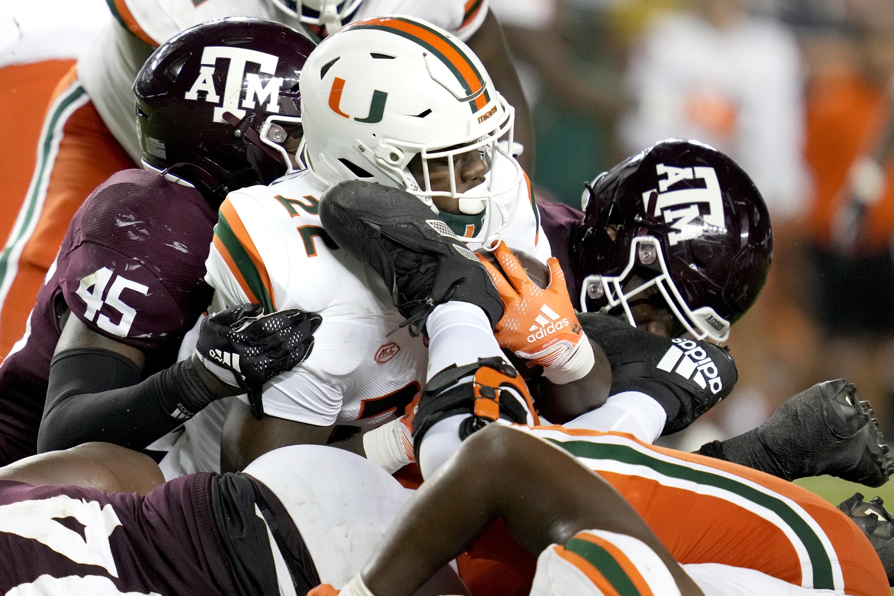 College Football Picks: SEC test for A& Hoops powers clash | AP News