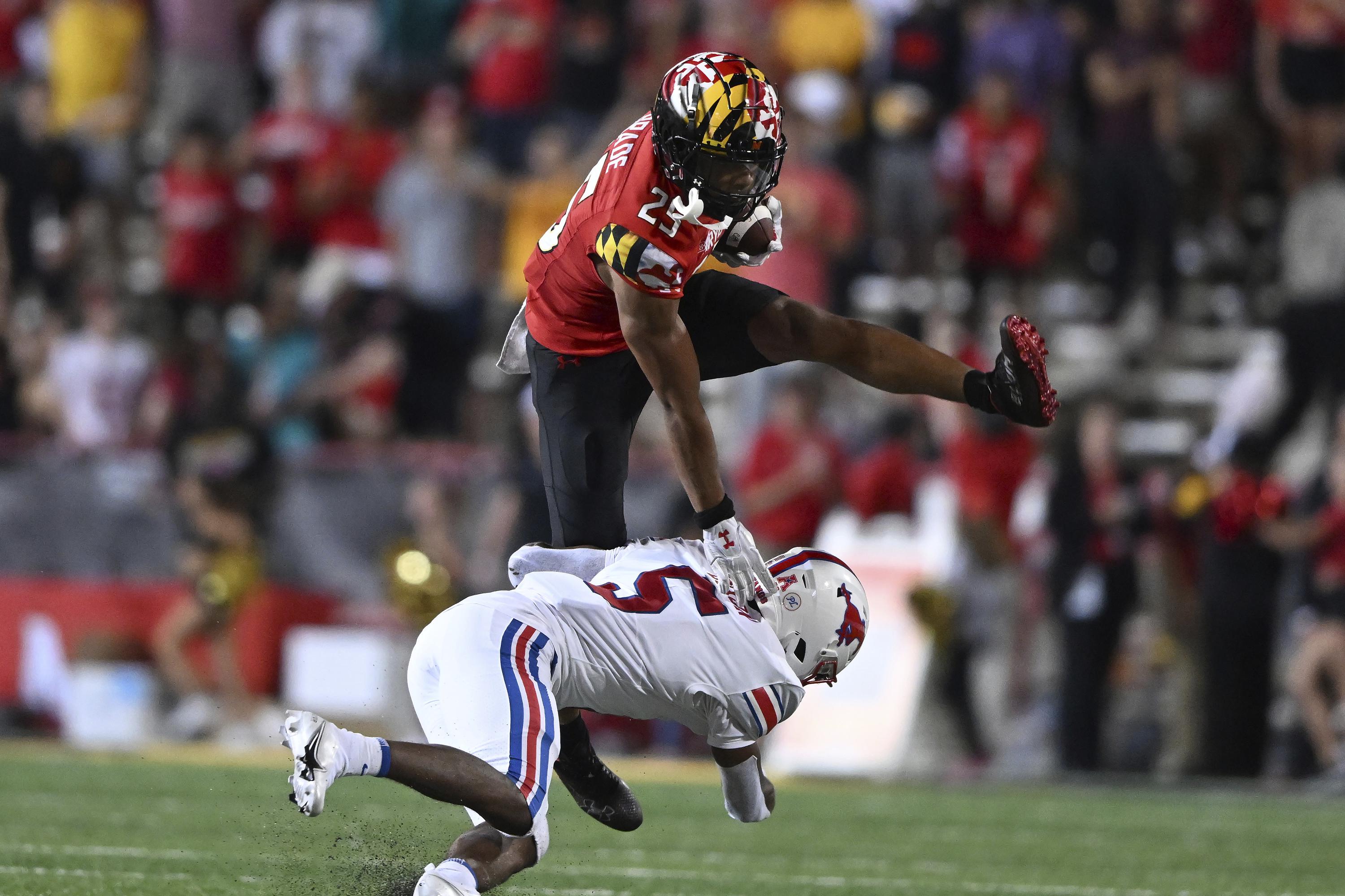 Maryland overcomes 15 penalties in 34-27 win over SMU | AP News