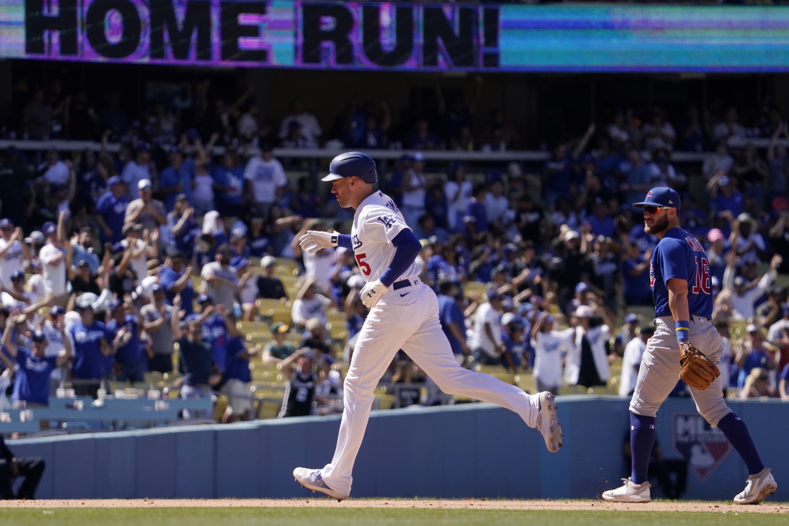 Freeman gets 4 hits, Dodgers roar back to sweep Cubs 11-9 | AP News