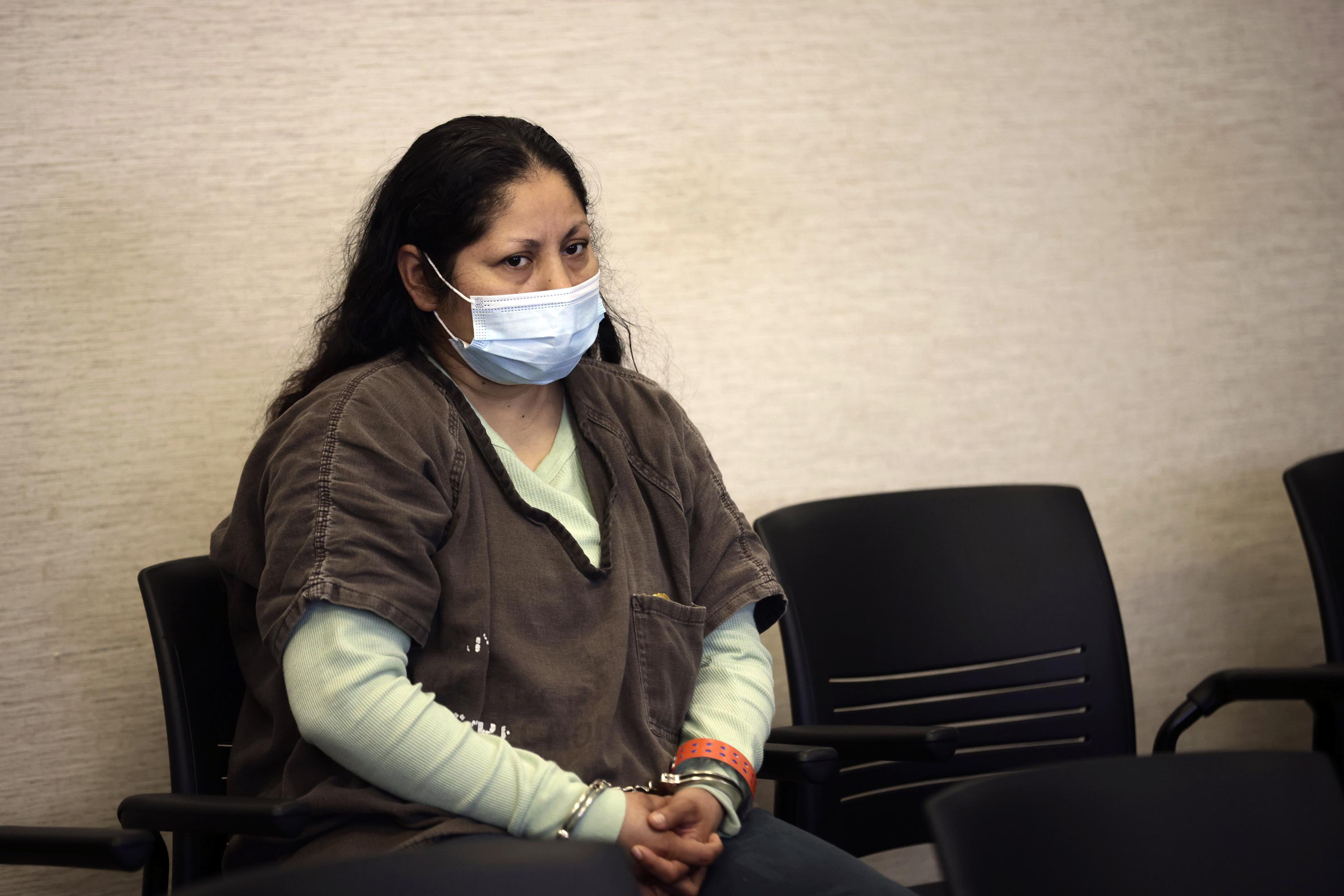 Woman arrested in baby kidnapping met family at church | AP News