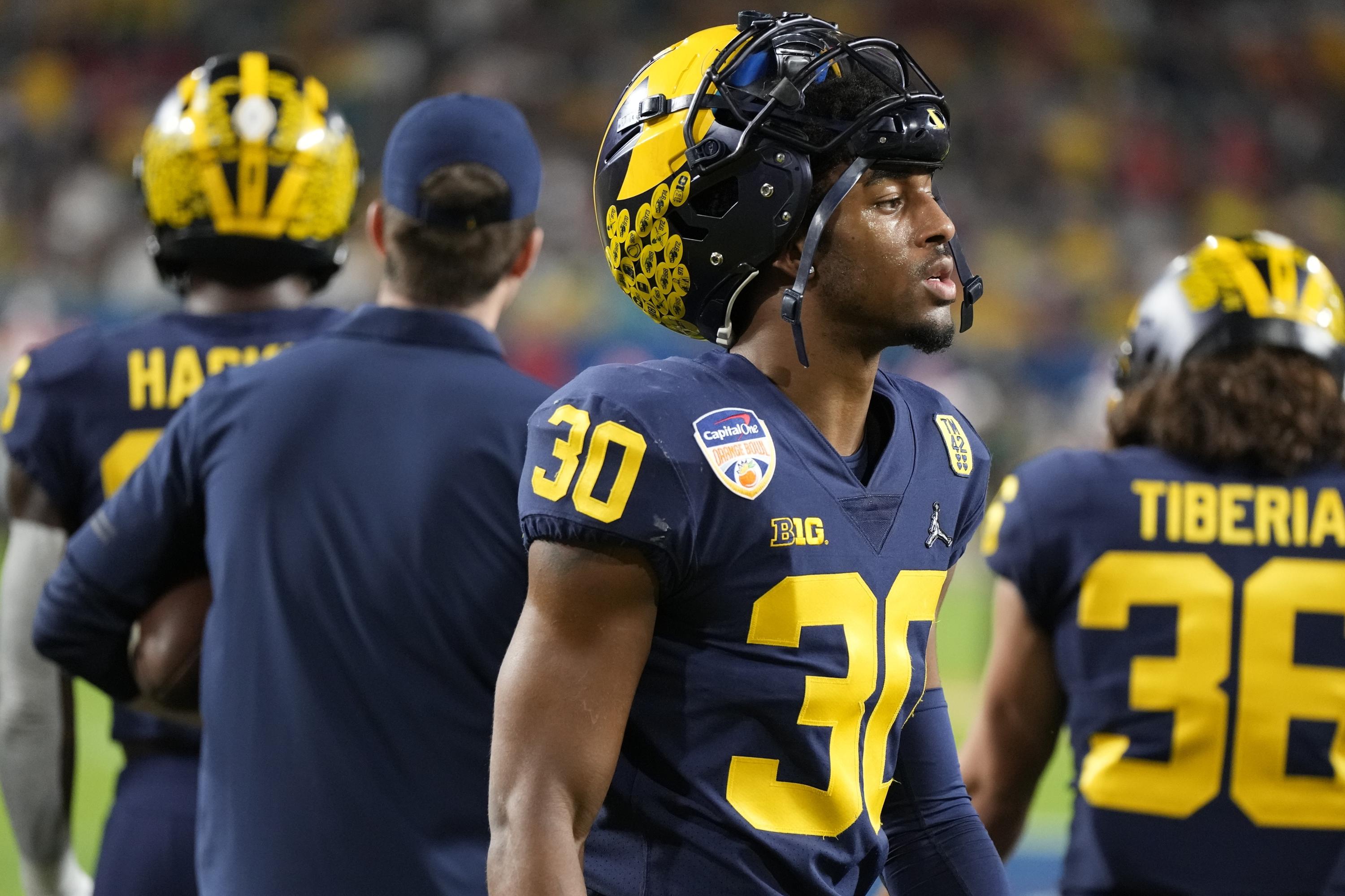 Michigan DB Dax Hill starts Orange Bowl against Georgia | AP News