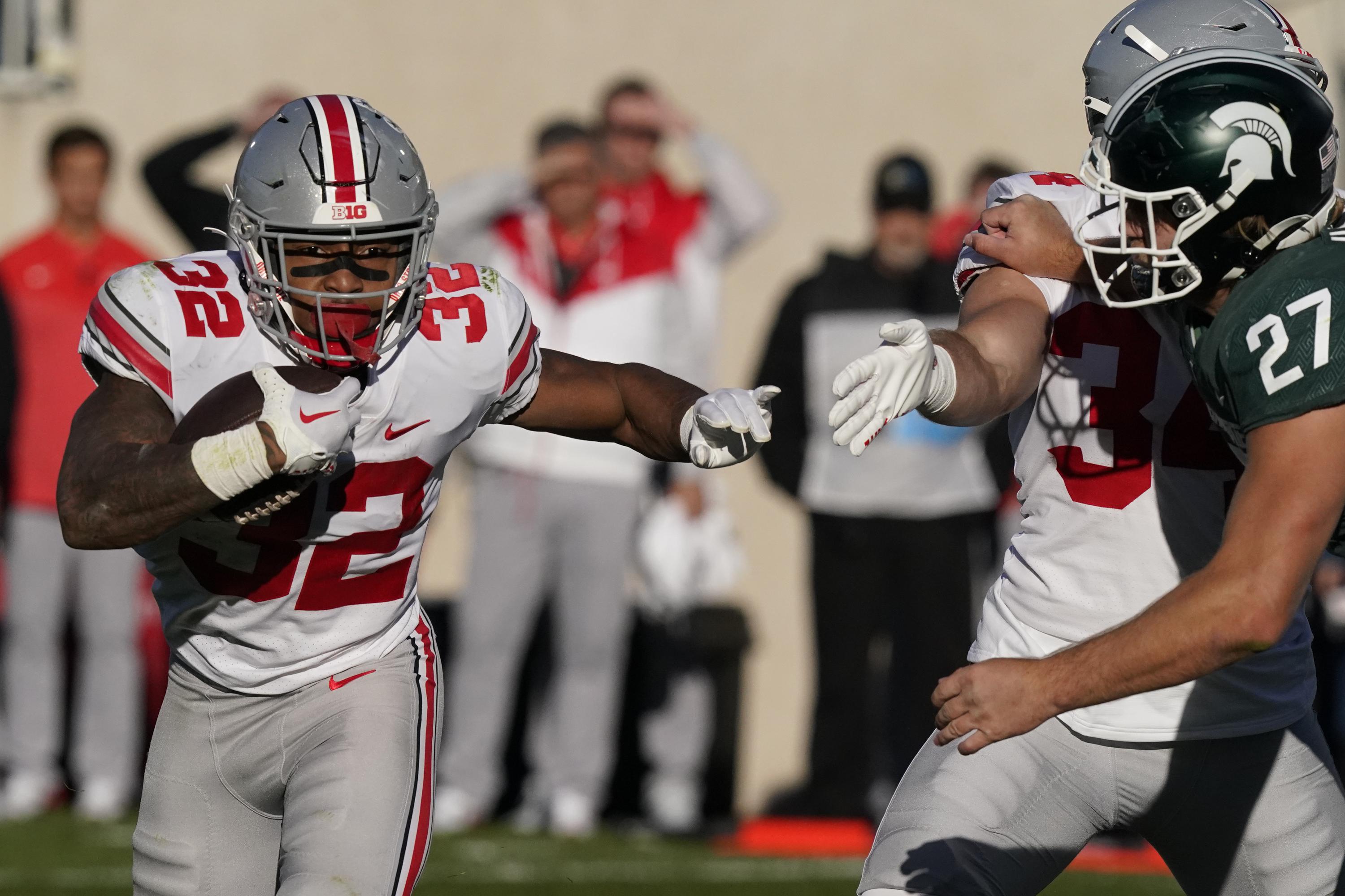 No. 3 Ohio State RB Henderson hurt against Michigan State | AP News