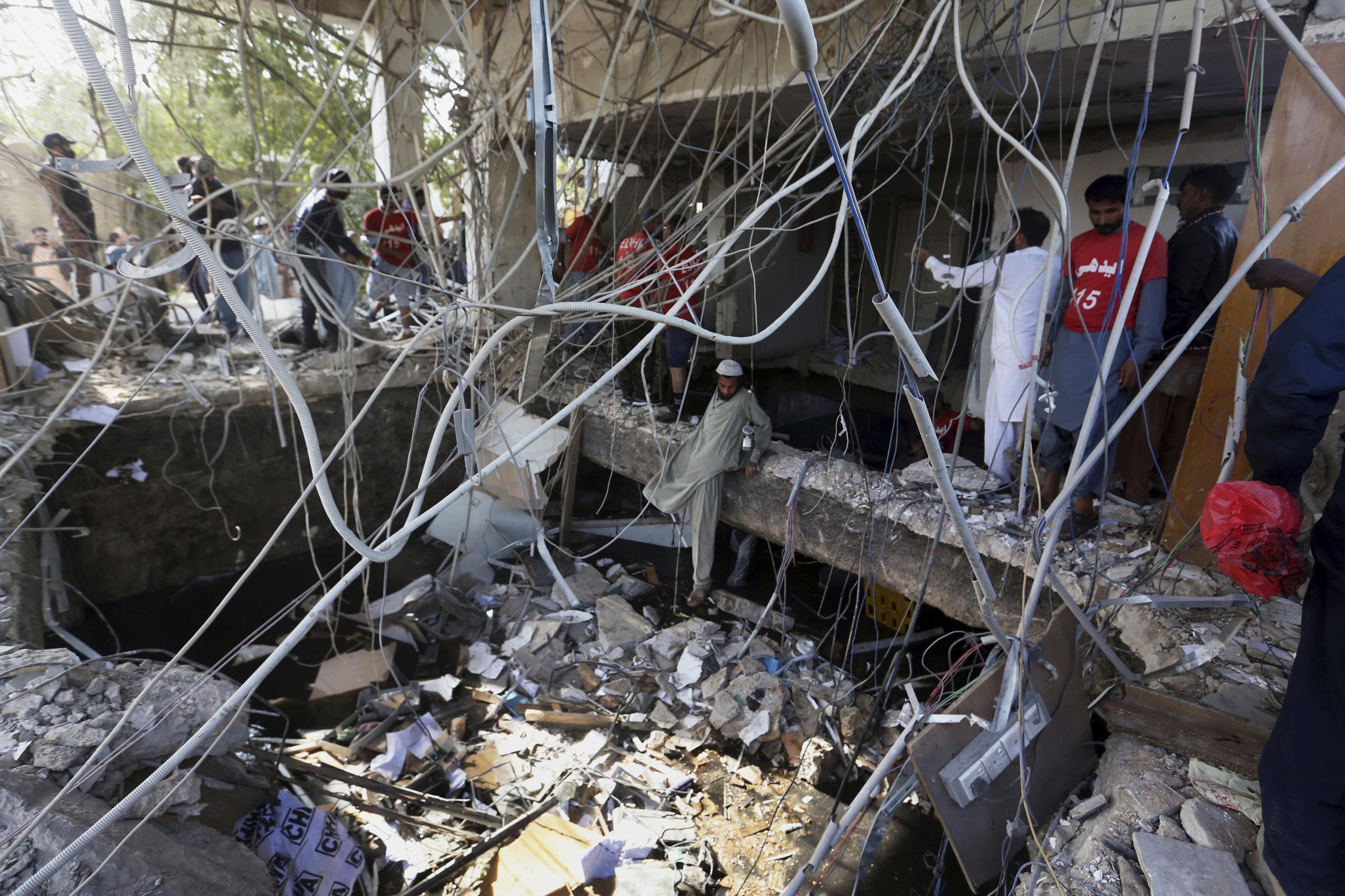 Gas explosion in sewer kills 12 in Pakistan's largest city | AP News