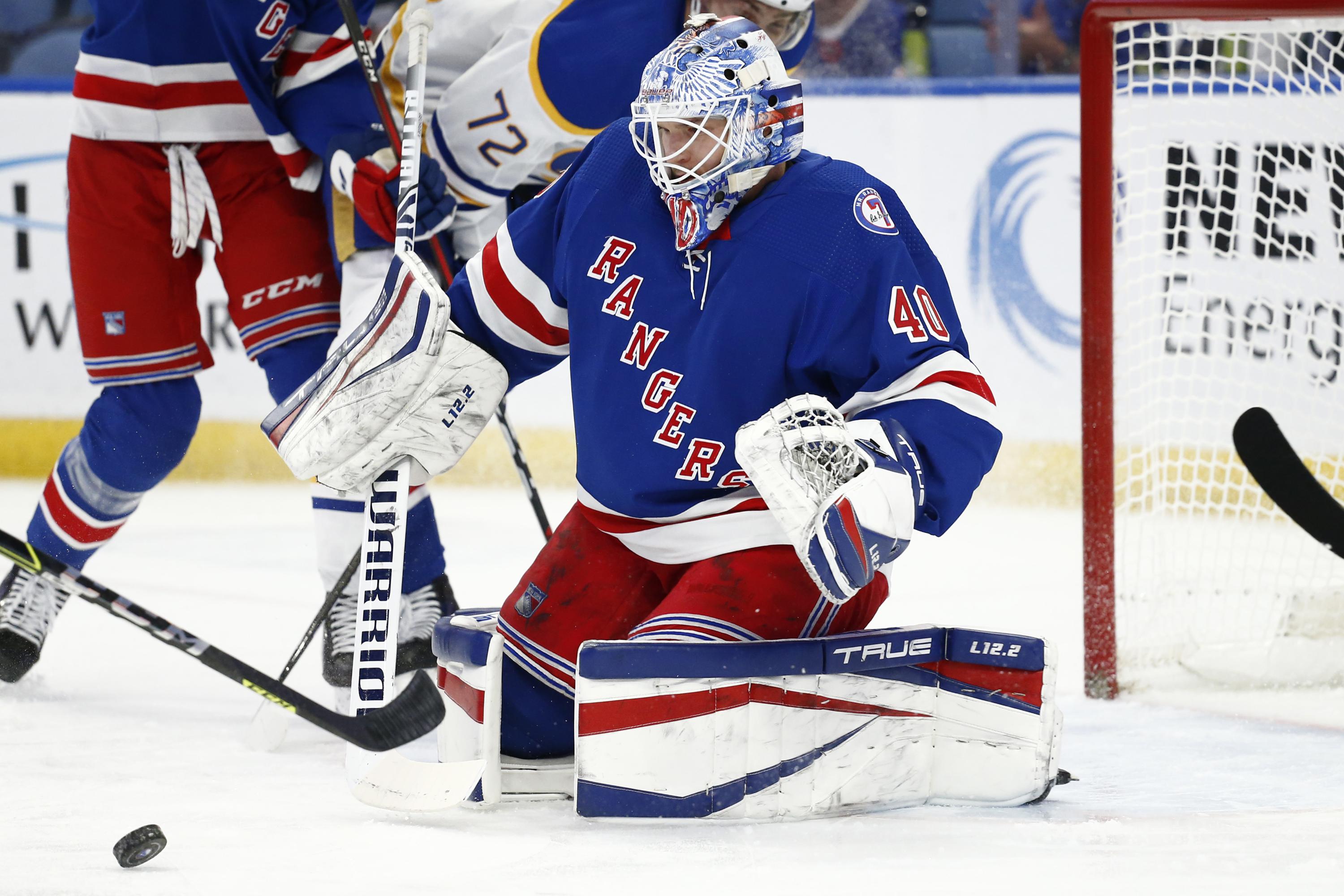 Late Sabres goal waved off, Rangers hold on for 2-1 win | AP News
