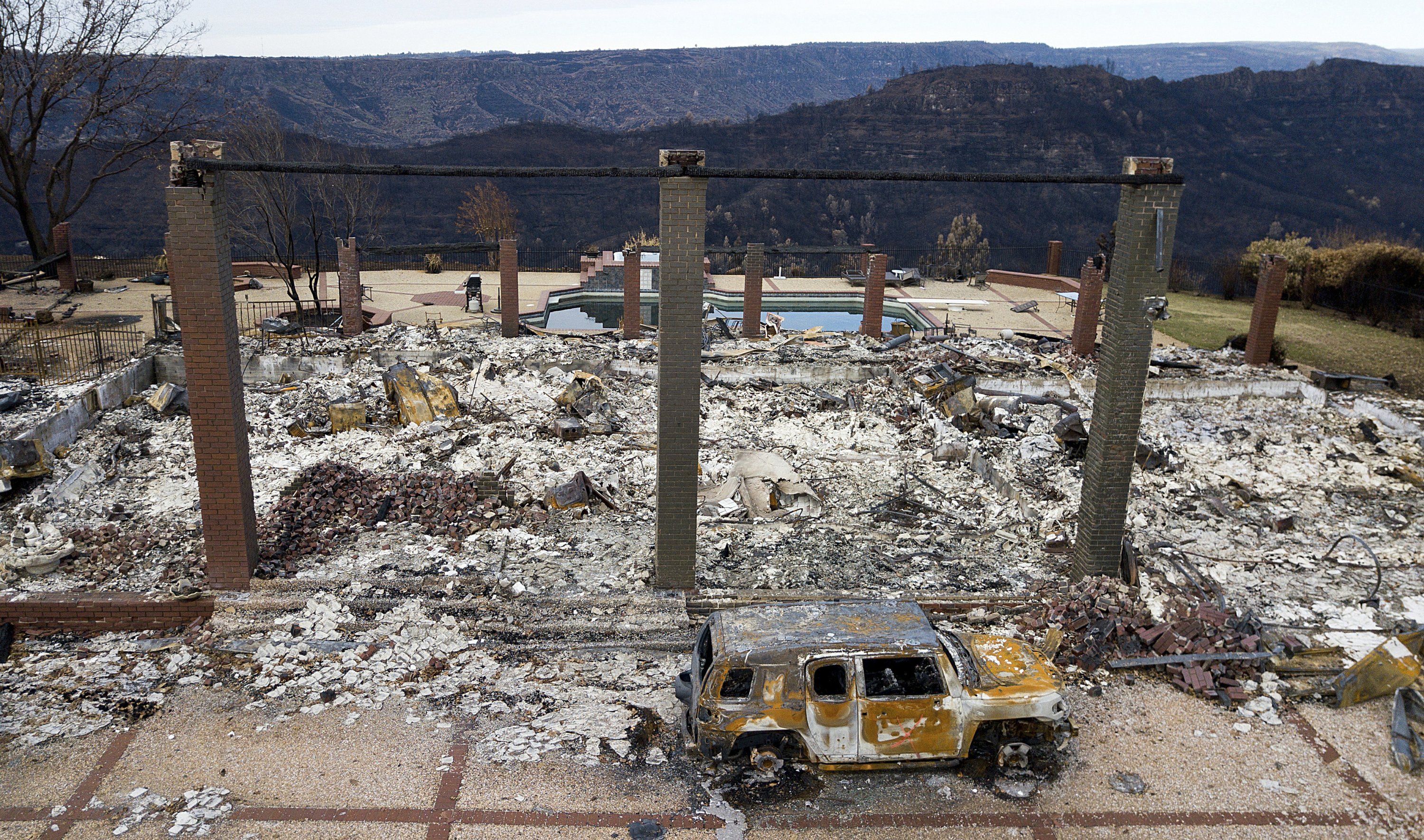 Judge OKs nearly $25 billion for PG&E fire victims, insurers | AP News