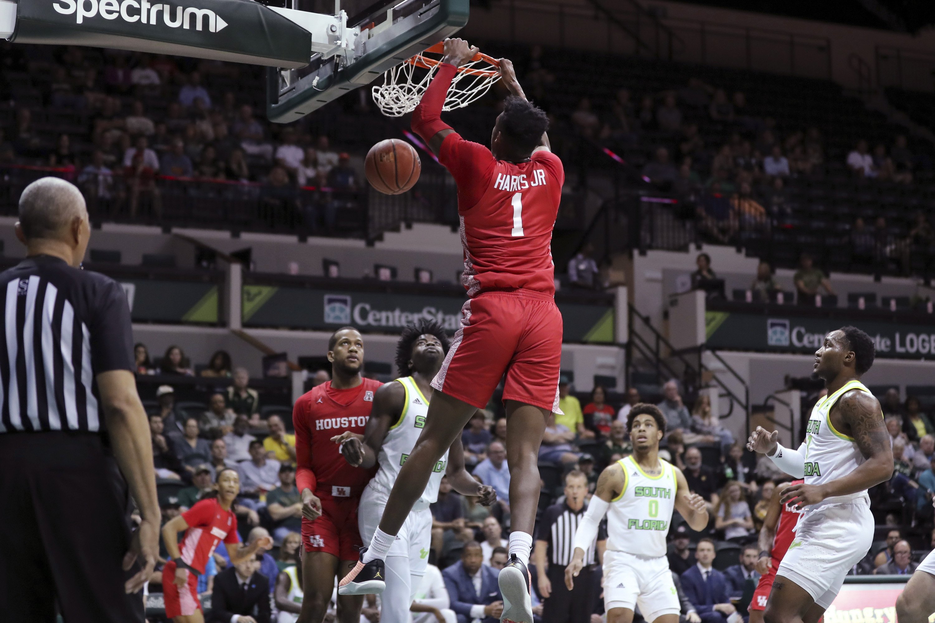 Grimes scores 22, No. 20 Houston holds off USF 62-58 | AP News