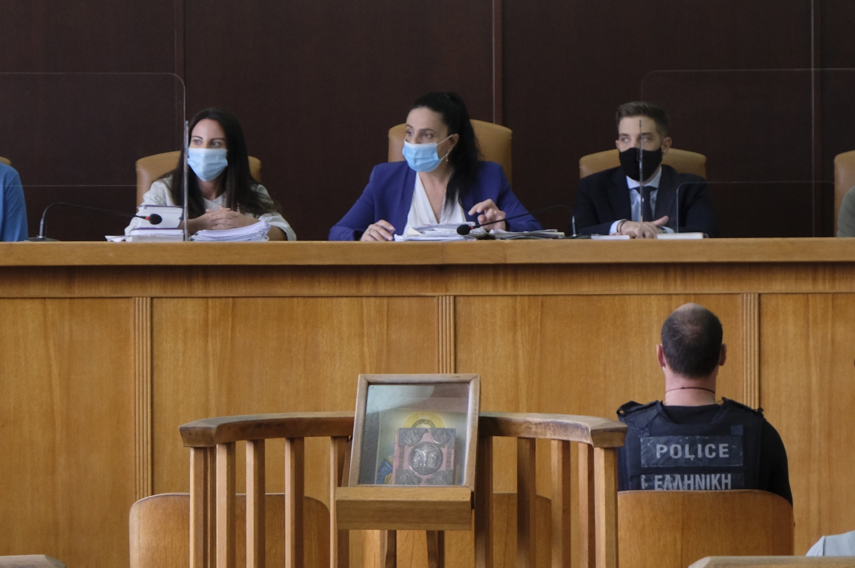 Greek man convicted of murdering US scientist on Crete | AP News