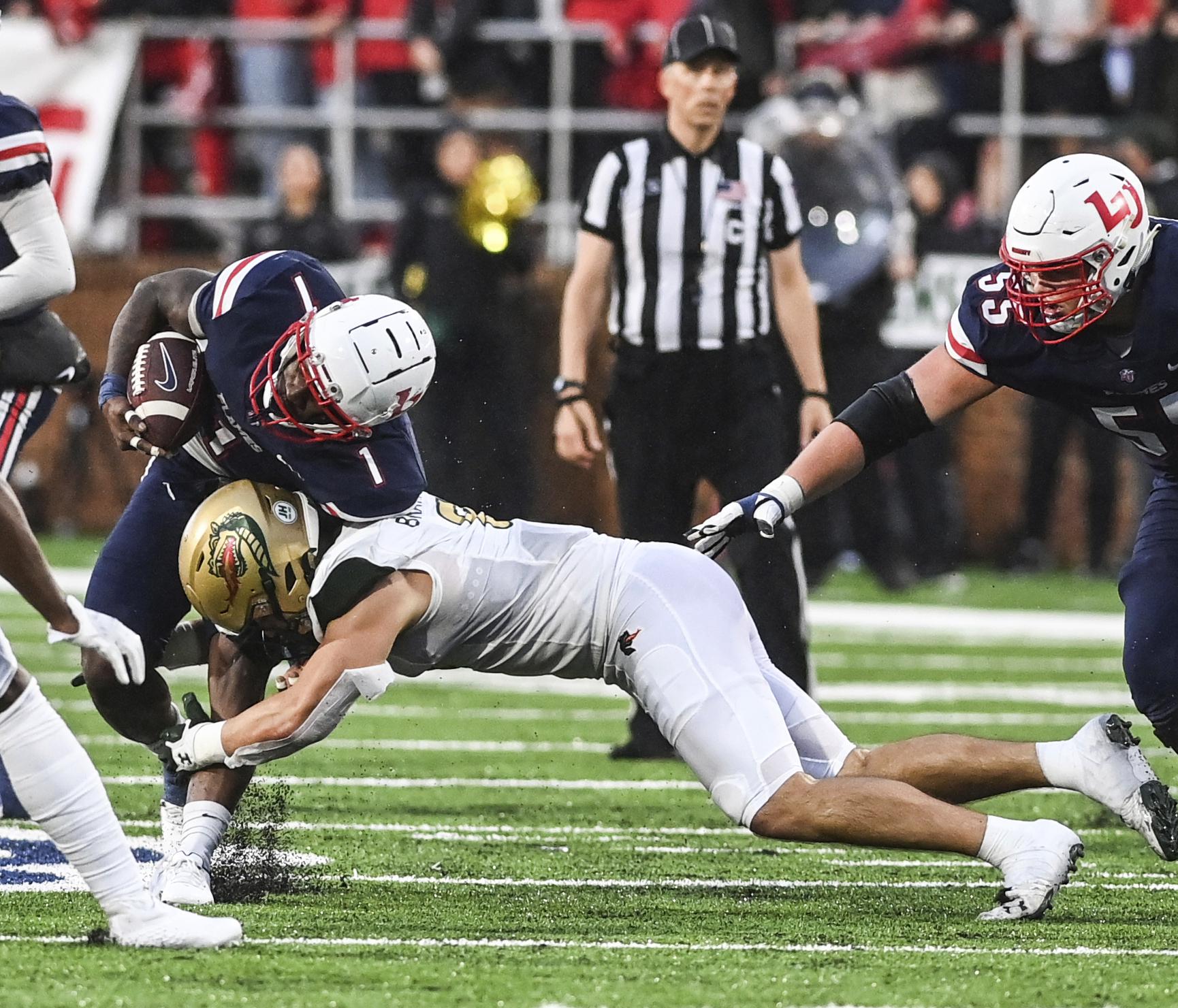 Salter leads Liberty to 21-14 victory over UAB | AP News