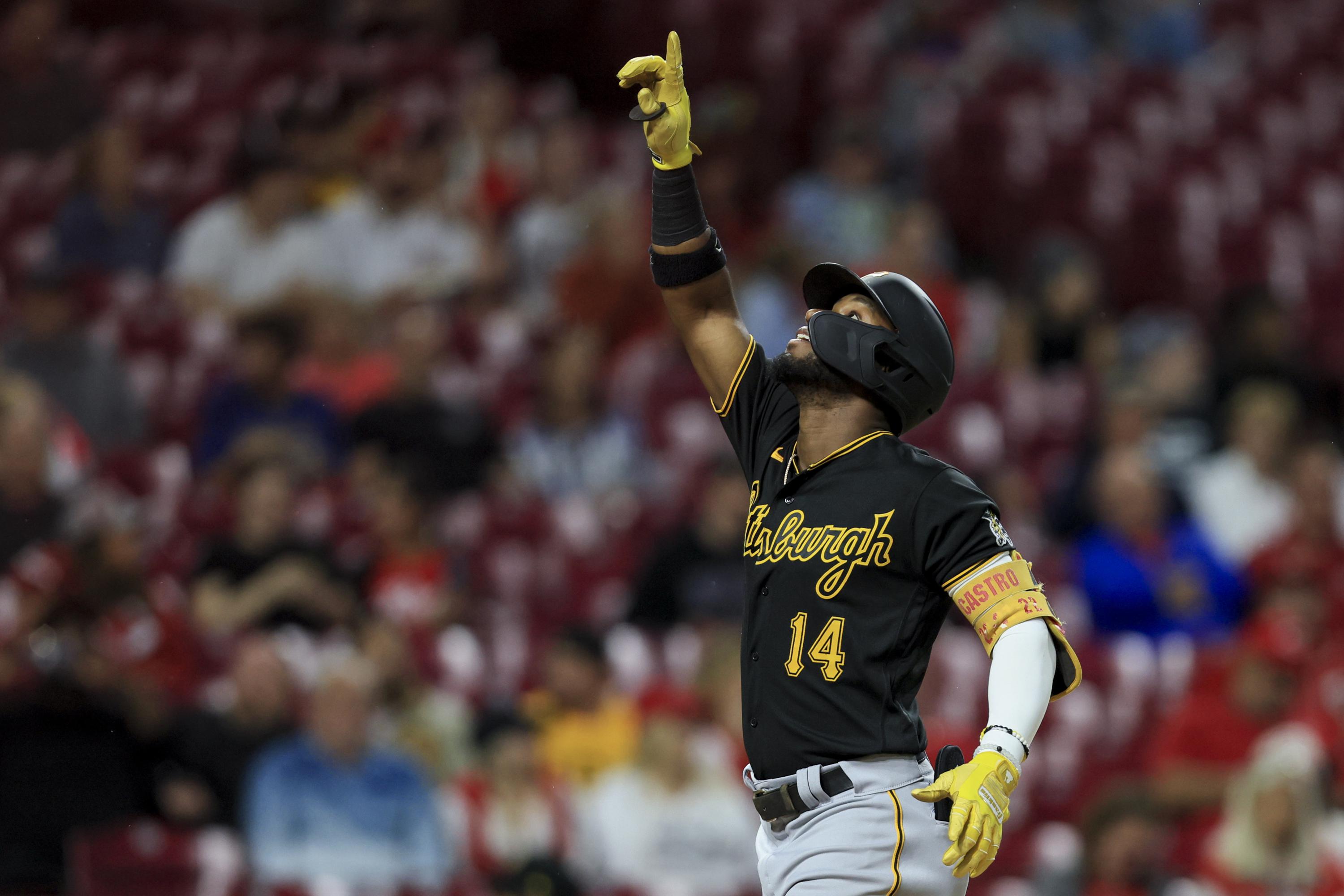 Pirates slam three home runs to down Reds | AP News