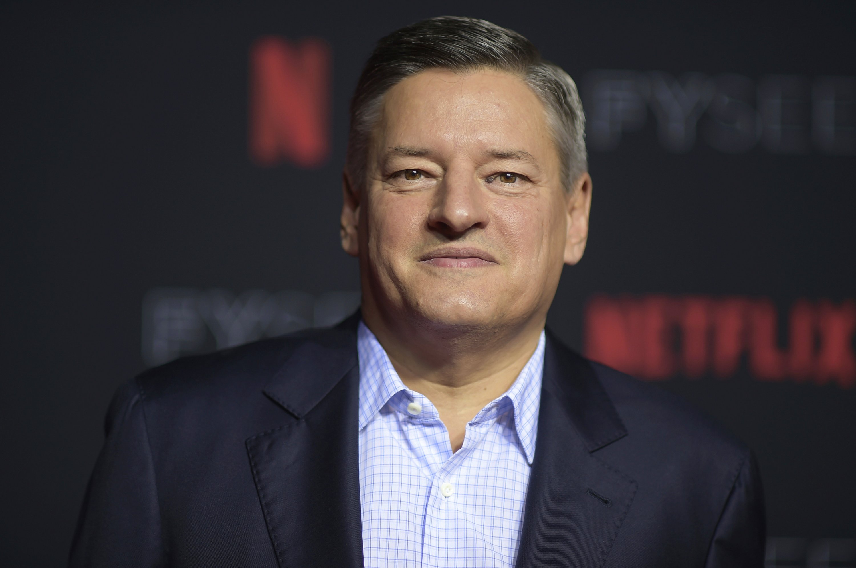 Netflix promotes content chief to co-CEO; adds 10M new subs | AP News