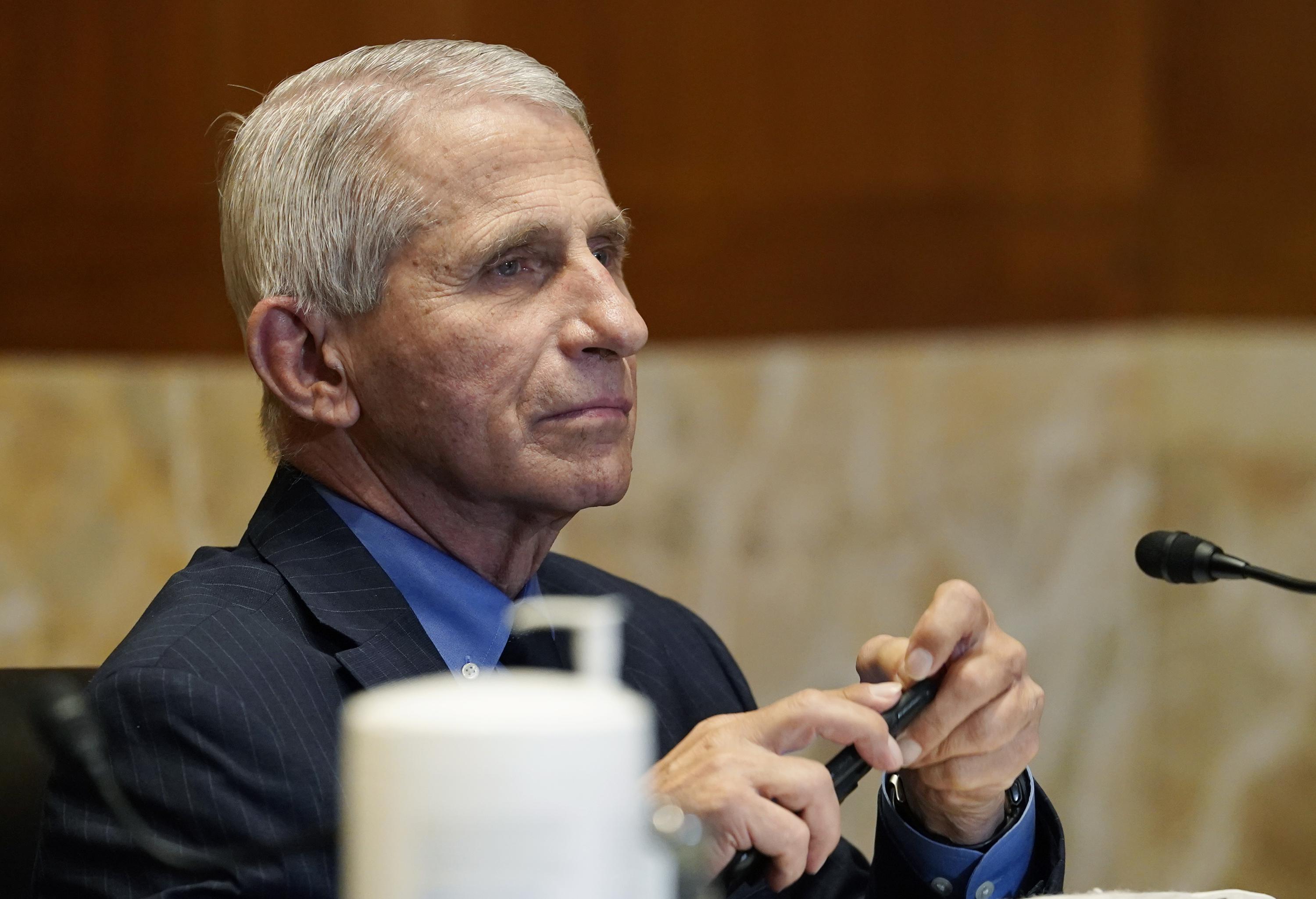 Fauci urges college grads to stand against disinformation | AP News