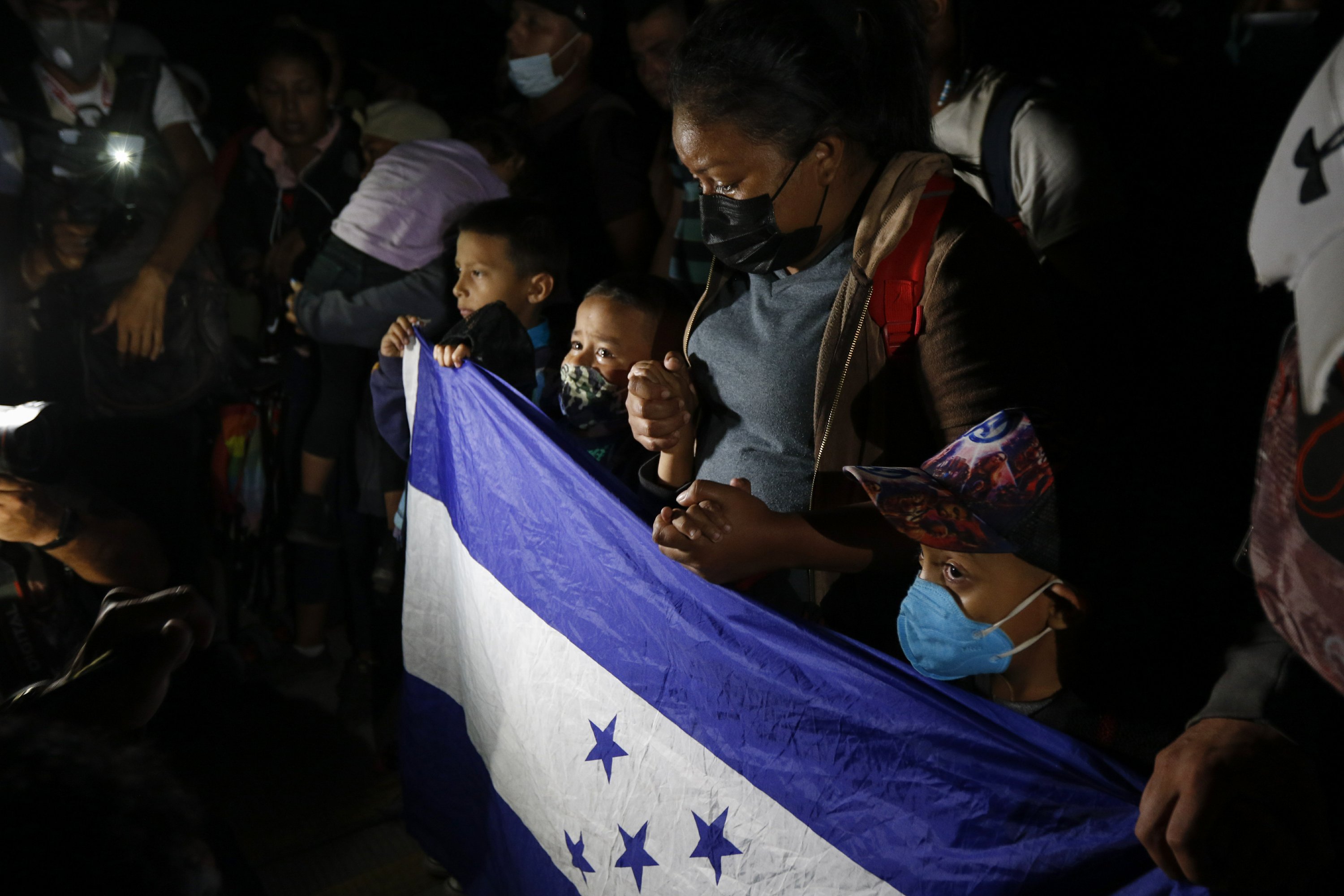 Migrant caravan on the move in Honduras in uncertain times | AP News