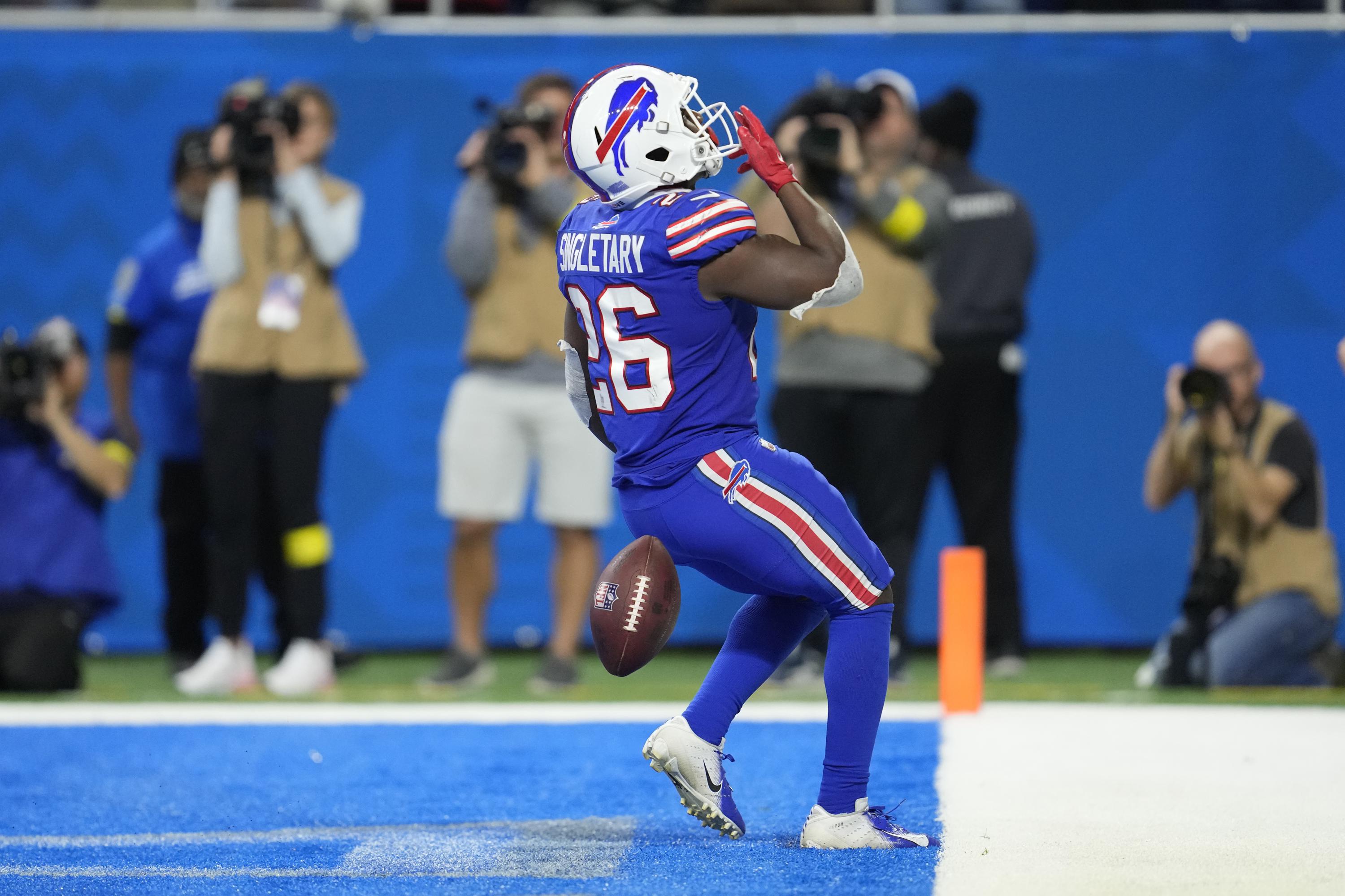 Bills run game finding its way with Singletary, Cook | AP News