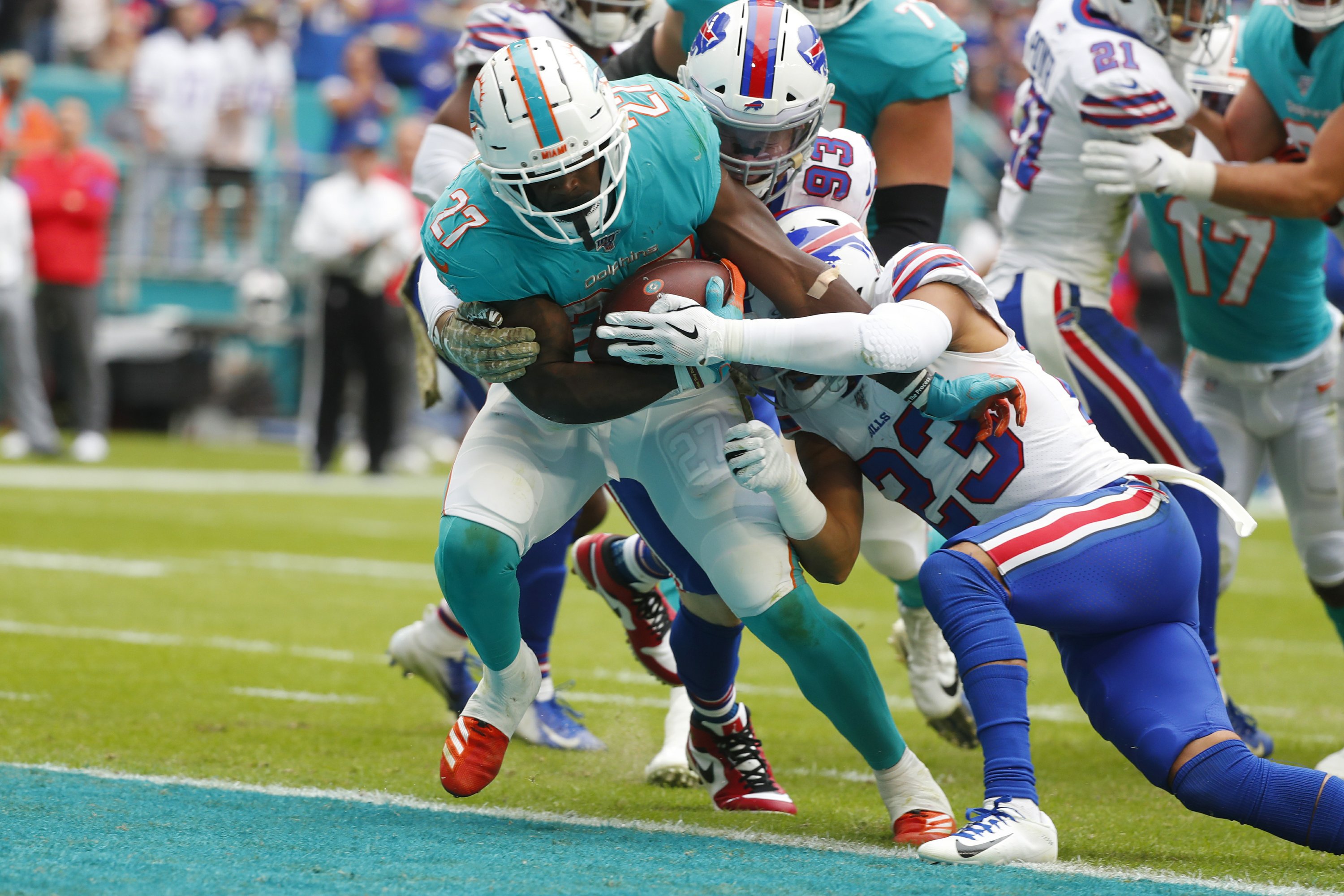 Dolphins’ ground game stuffed by Bills in 37-20 loss | AP News